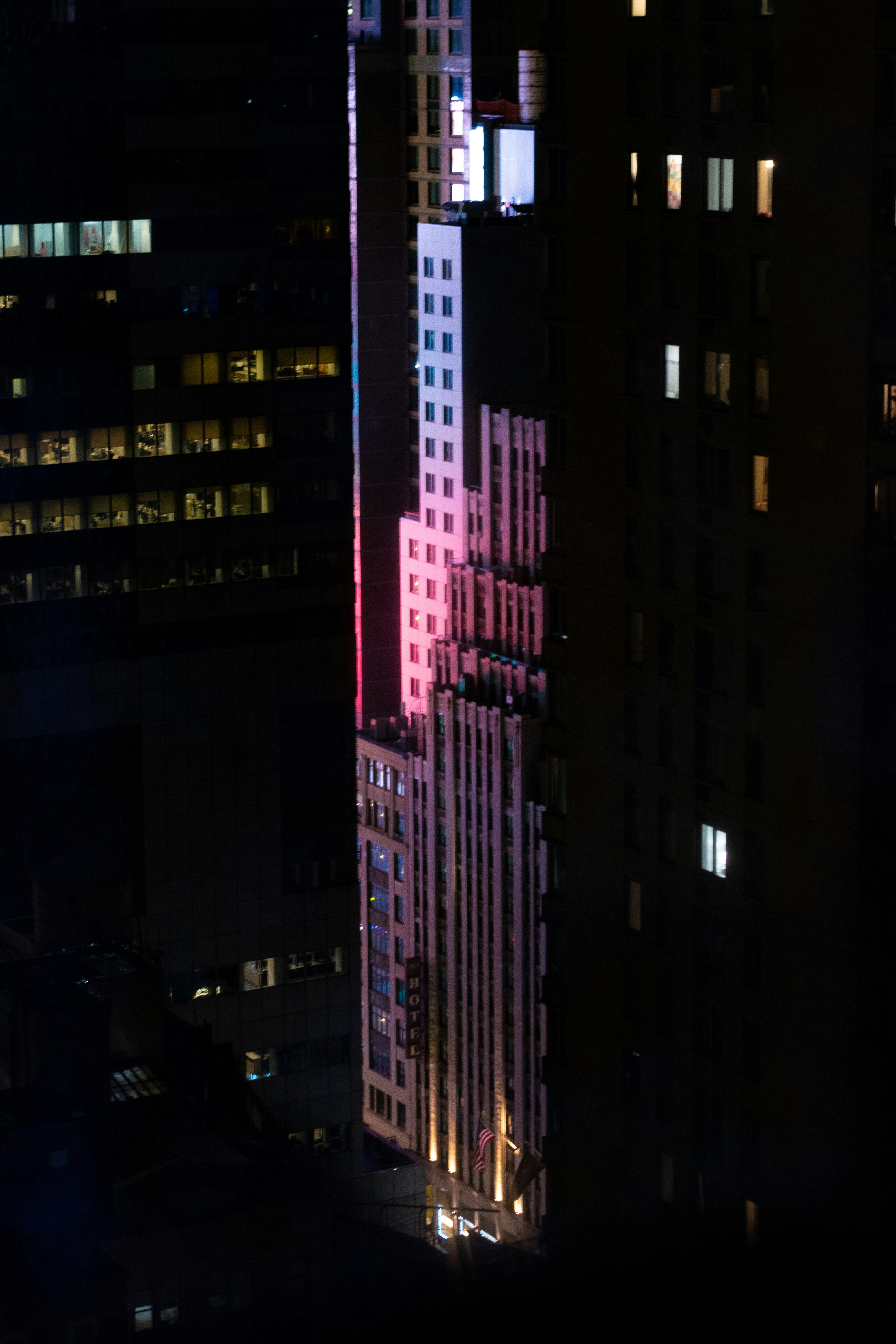 Neon Skyline Pierces the Night through Narrow Gaps