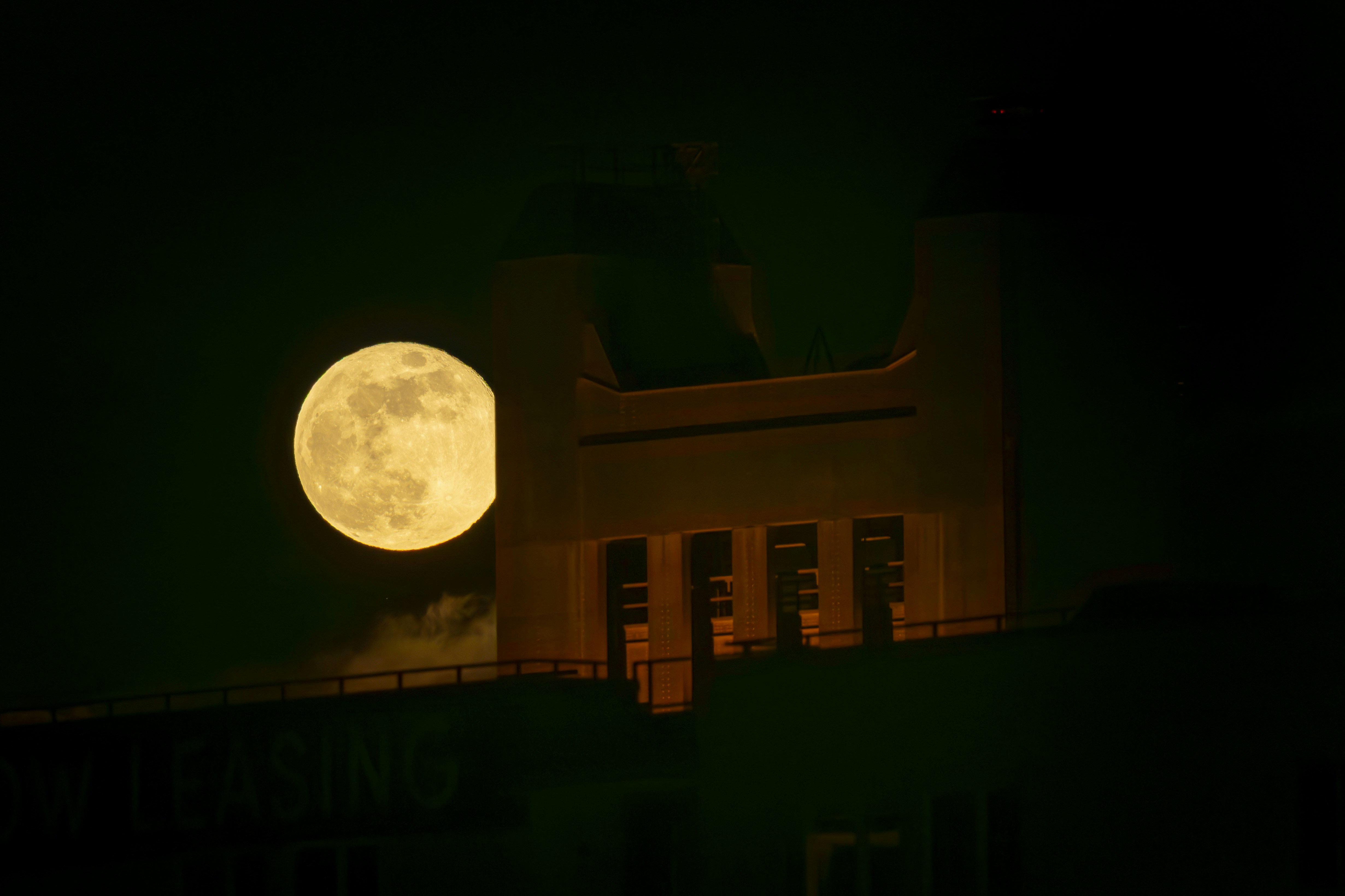 Moonlit Bell Tower Crowned by a Golden Lantern