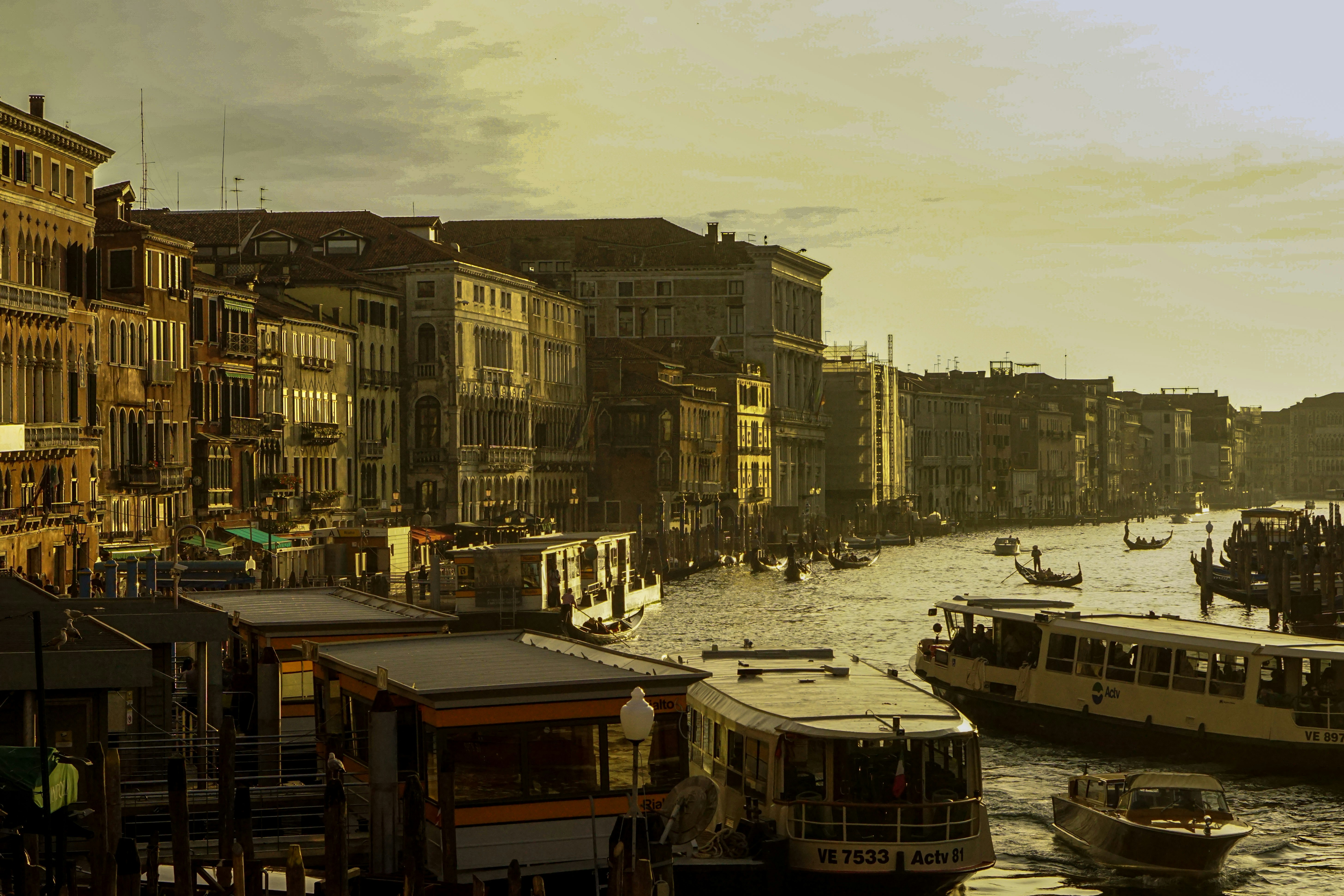 Golden Hour on the Grand Canal: Boats and Historic Facades