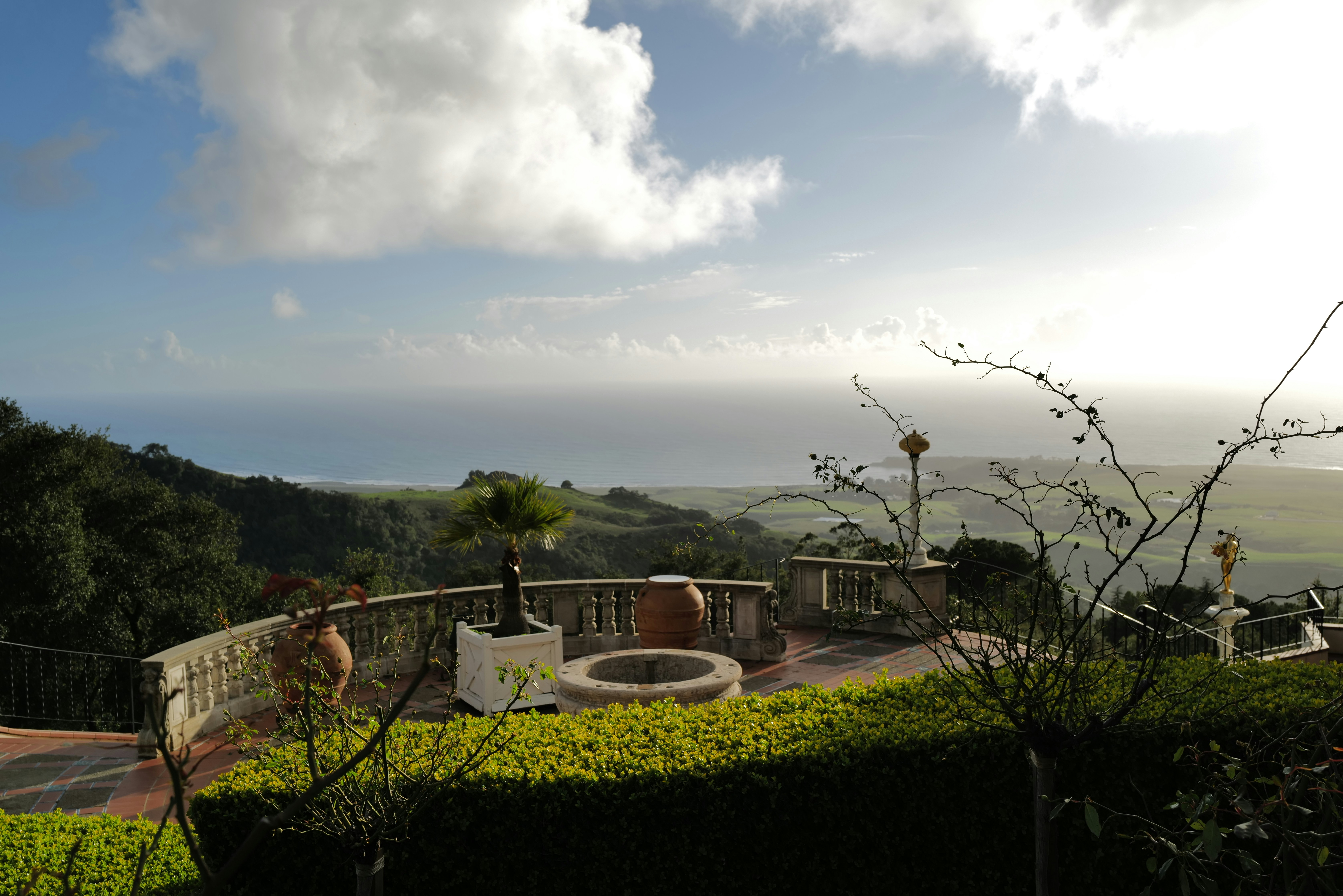 Sunlit Terrace Overlooking a Coastal Horizon
