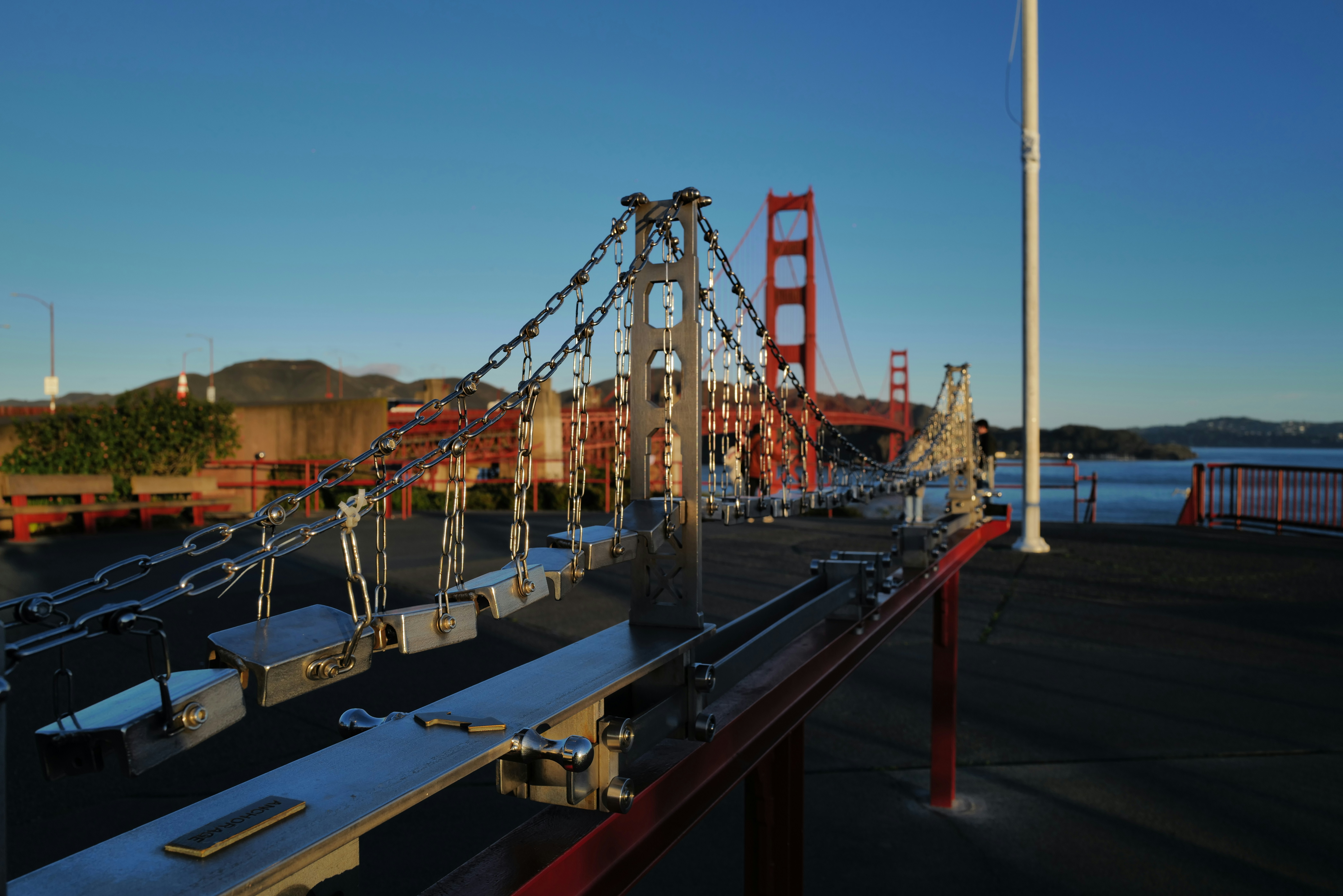 Golden Gate Twilight: Chains and Rails Reach Toward the Distant Horizon