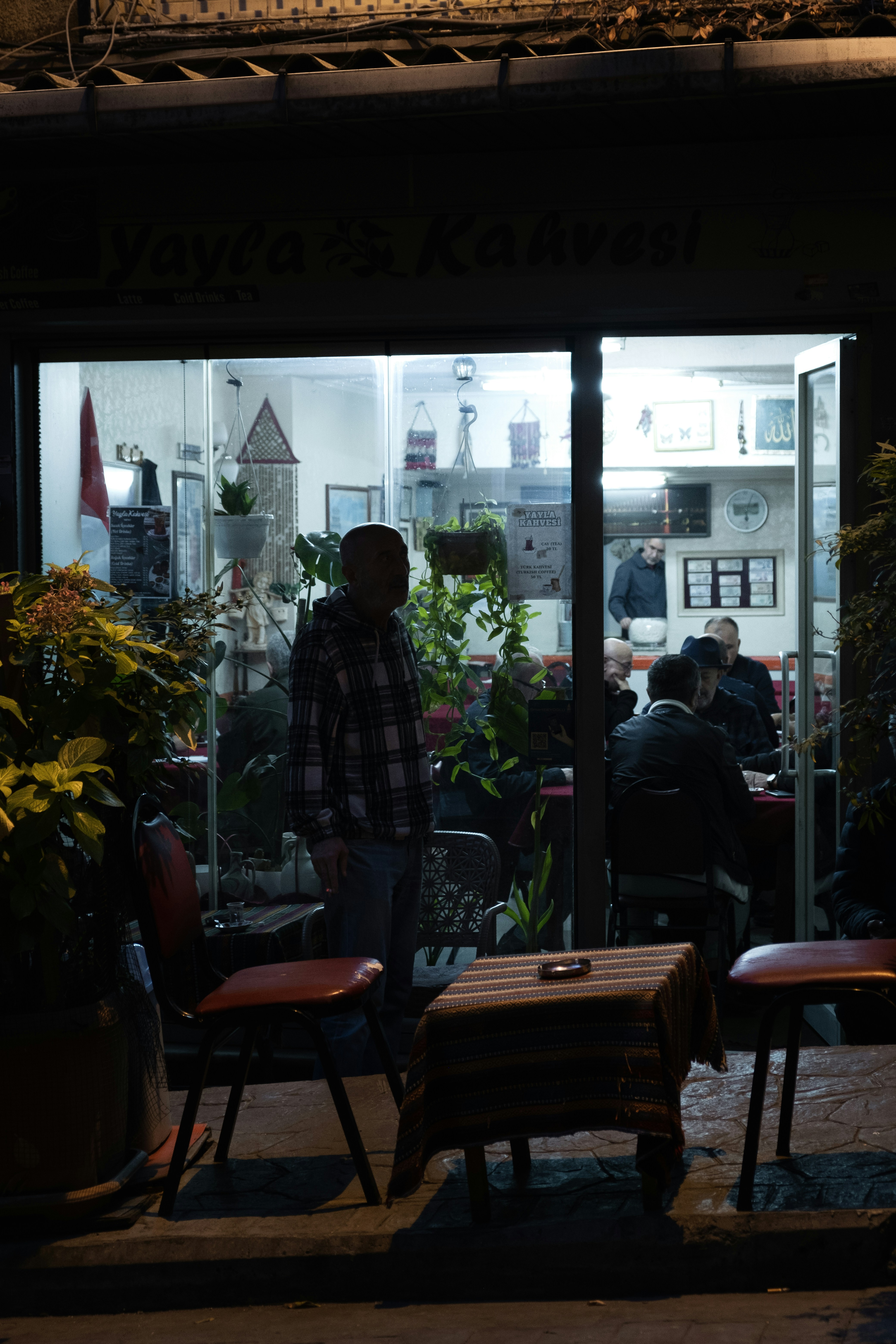 Evening Quiet at the Glass-Front Café