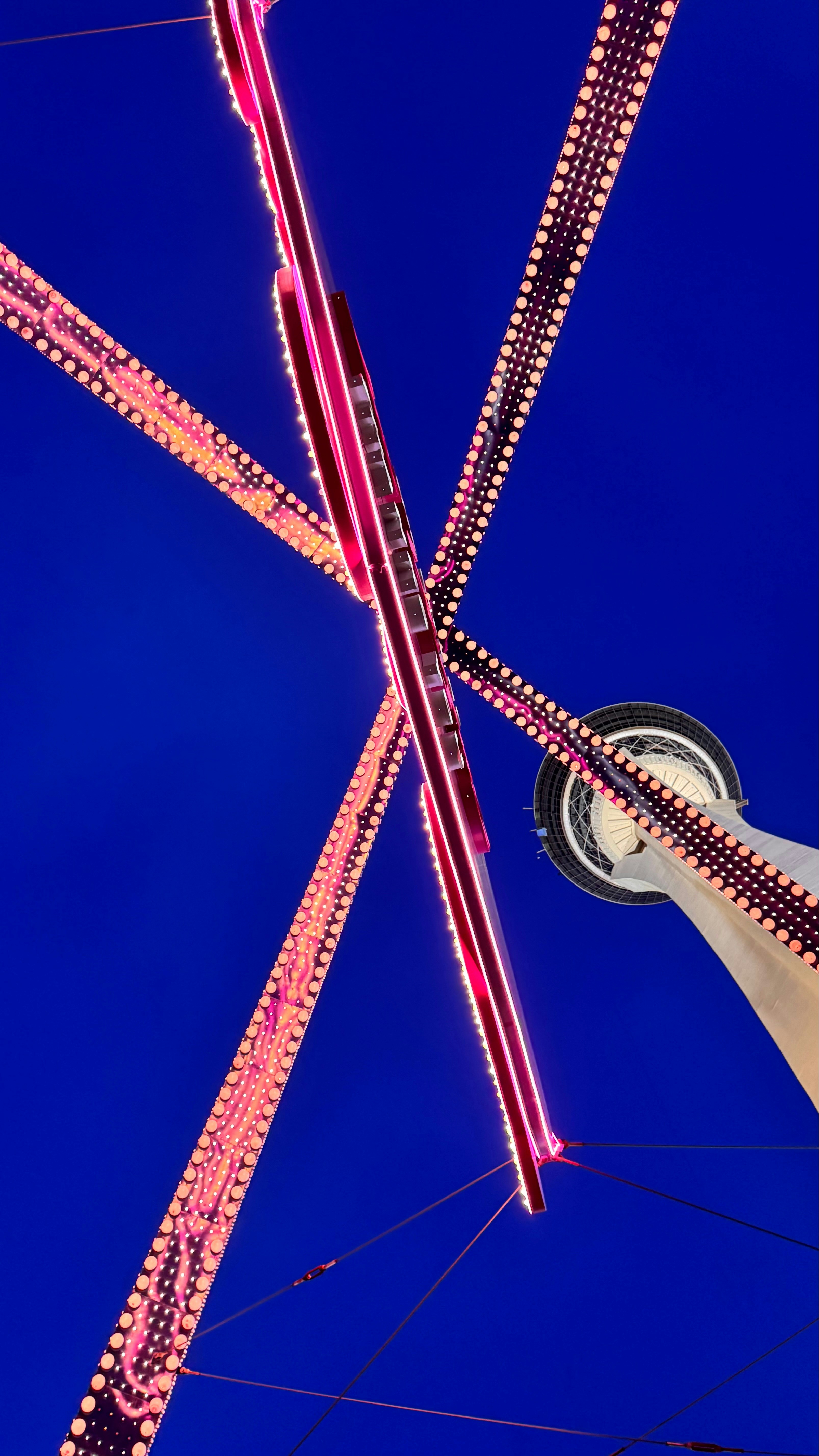 Neon Ladders to the Sky: A Night Ride Crossroads