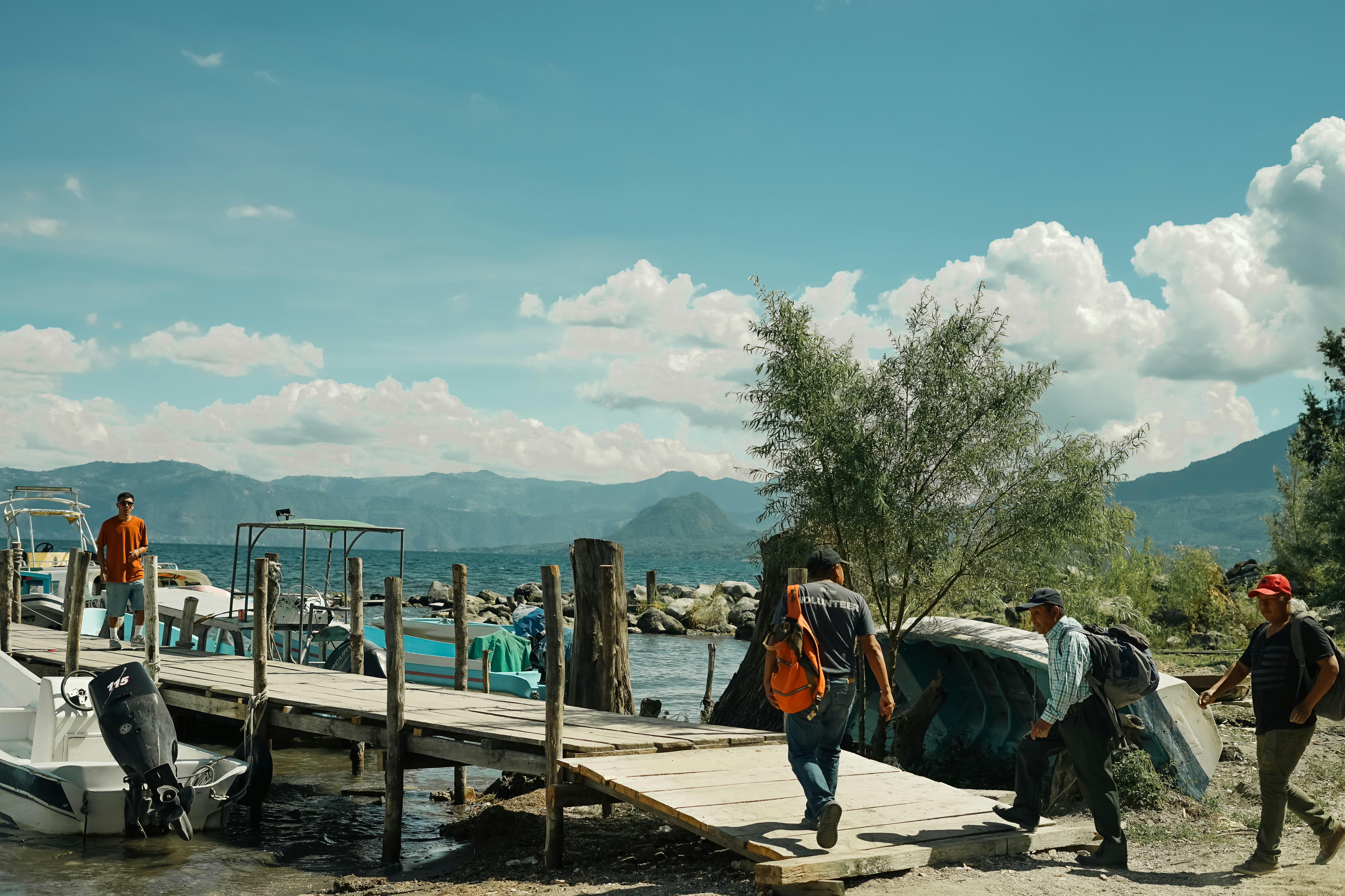 Dockside Murmur: Travelers Step onto a Quiet Lakefront