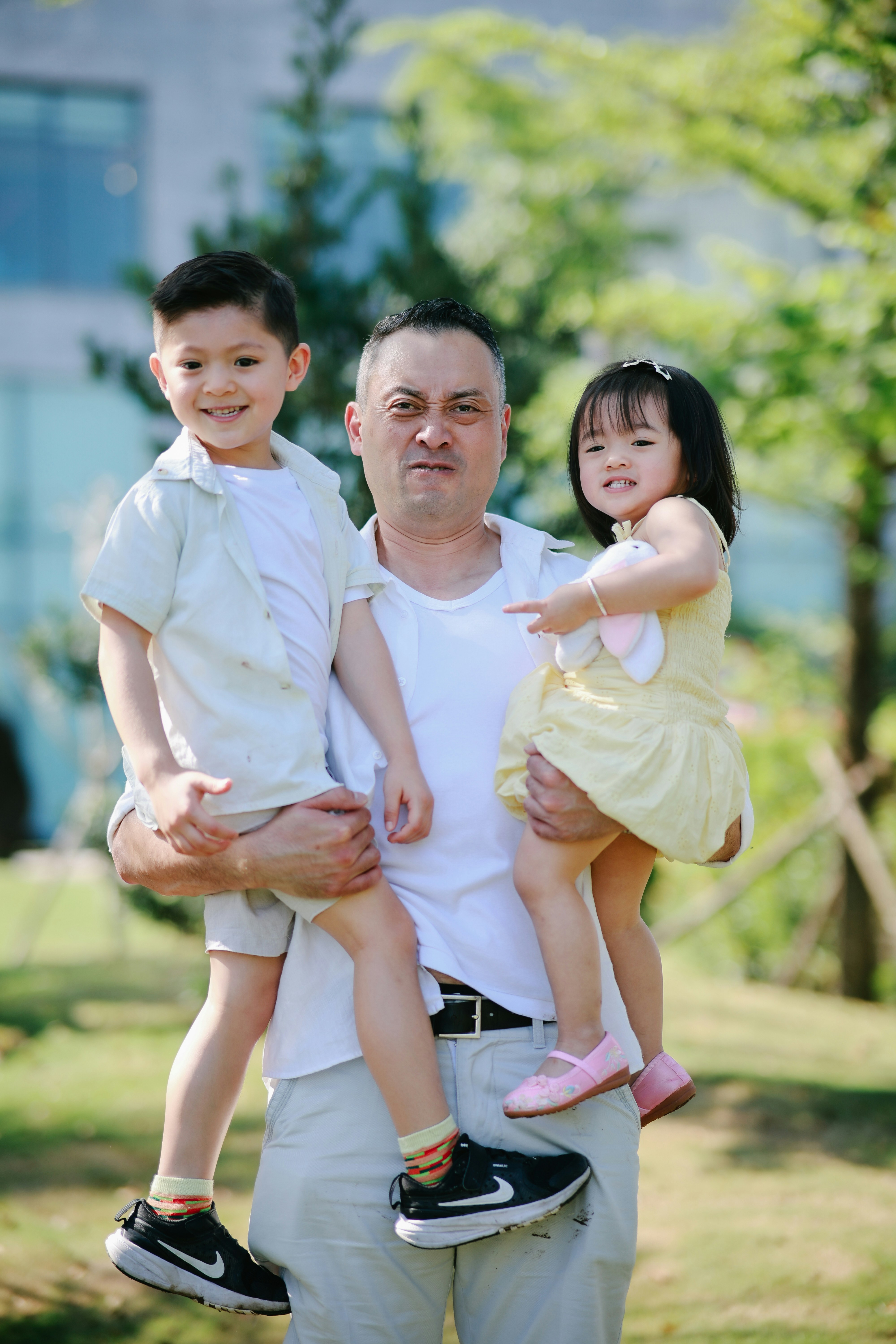 Dad's Warm Embrace: A Triptych of Joy in the Park