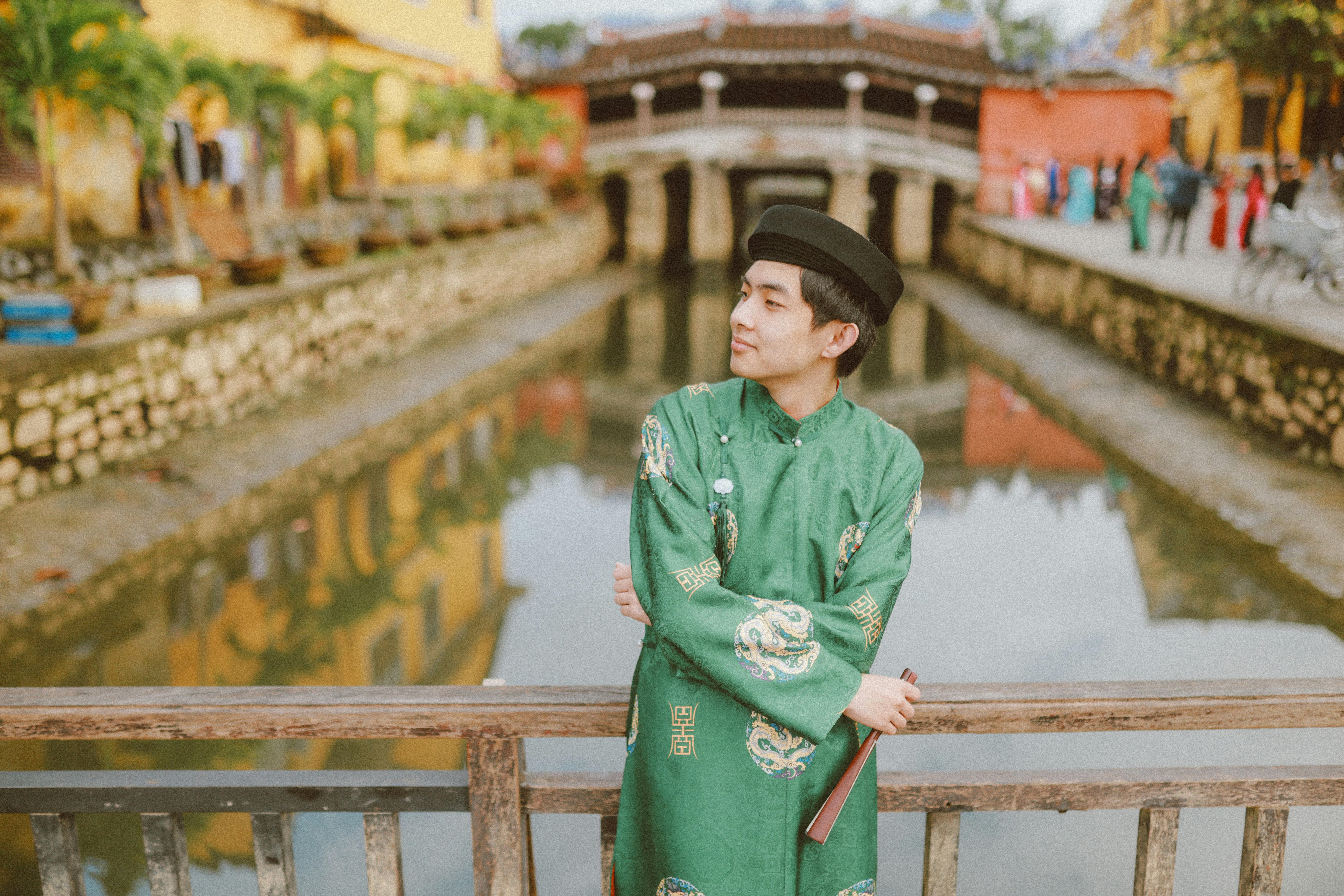 Green-robed Traveler by the Canal Bridge
