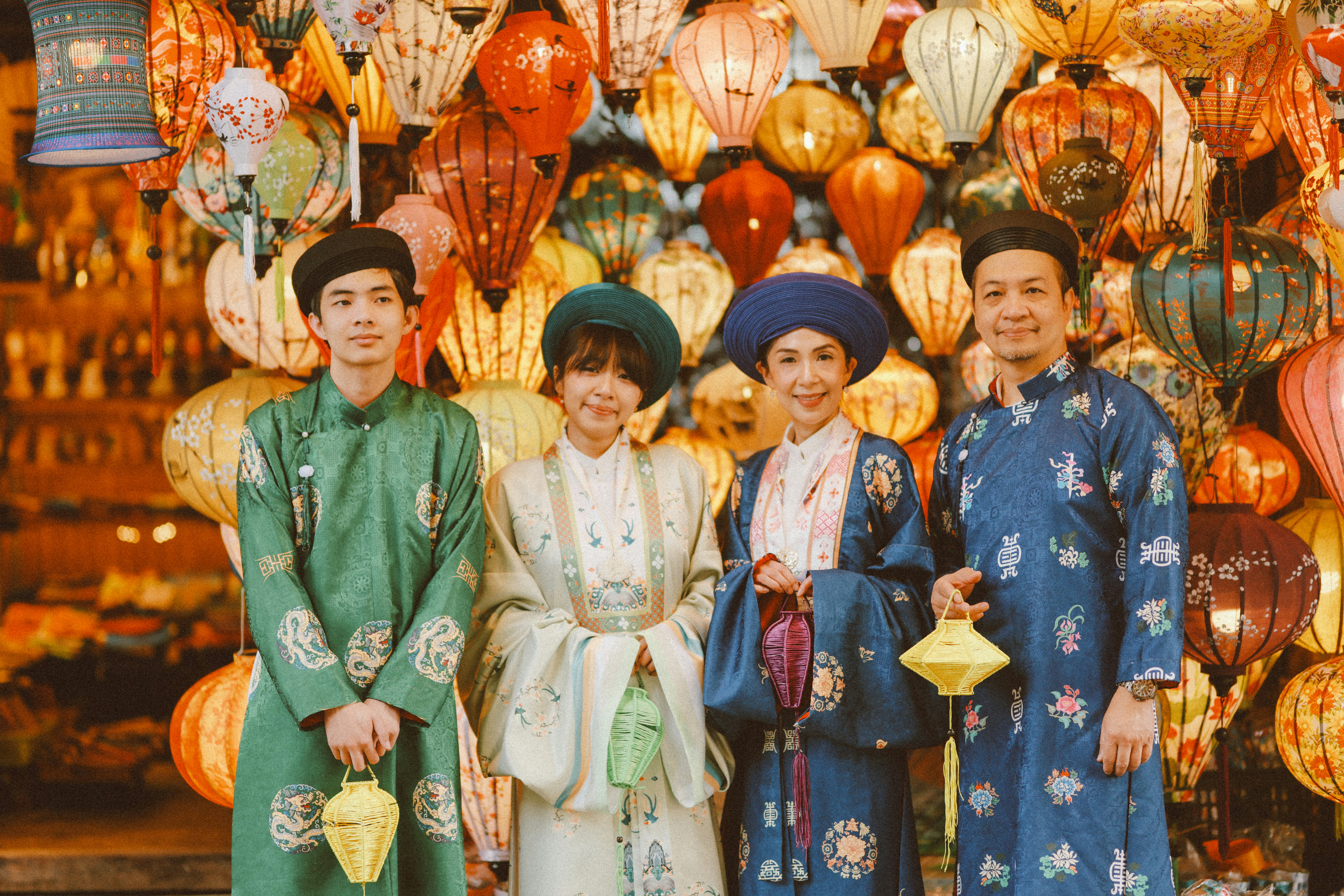 Colorful Lanterns and Traditional Attire: a Quartet in a Night Market