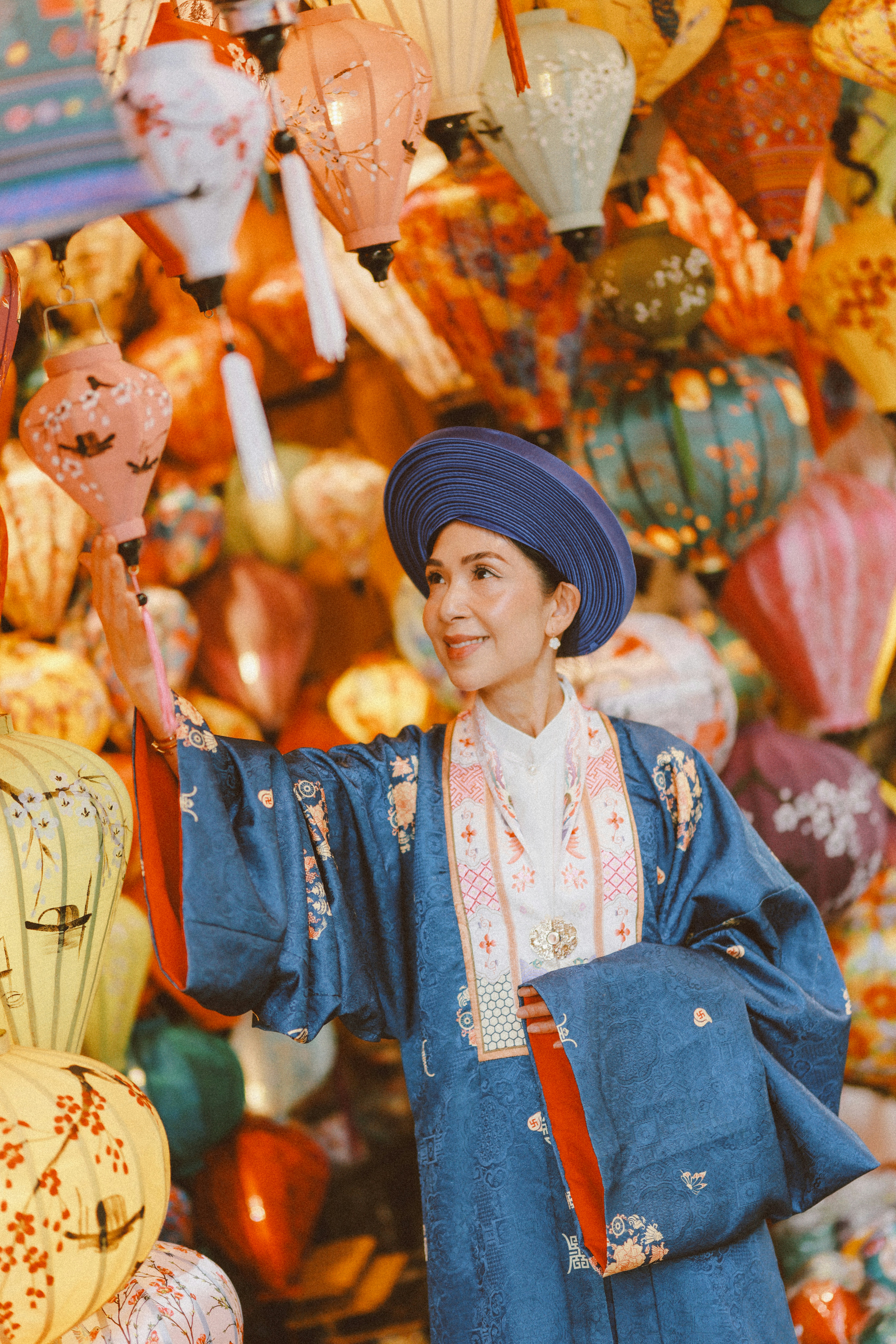 Blue Robe, Lantern Sea: A Glimpse Through Colorful Orbs
