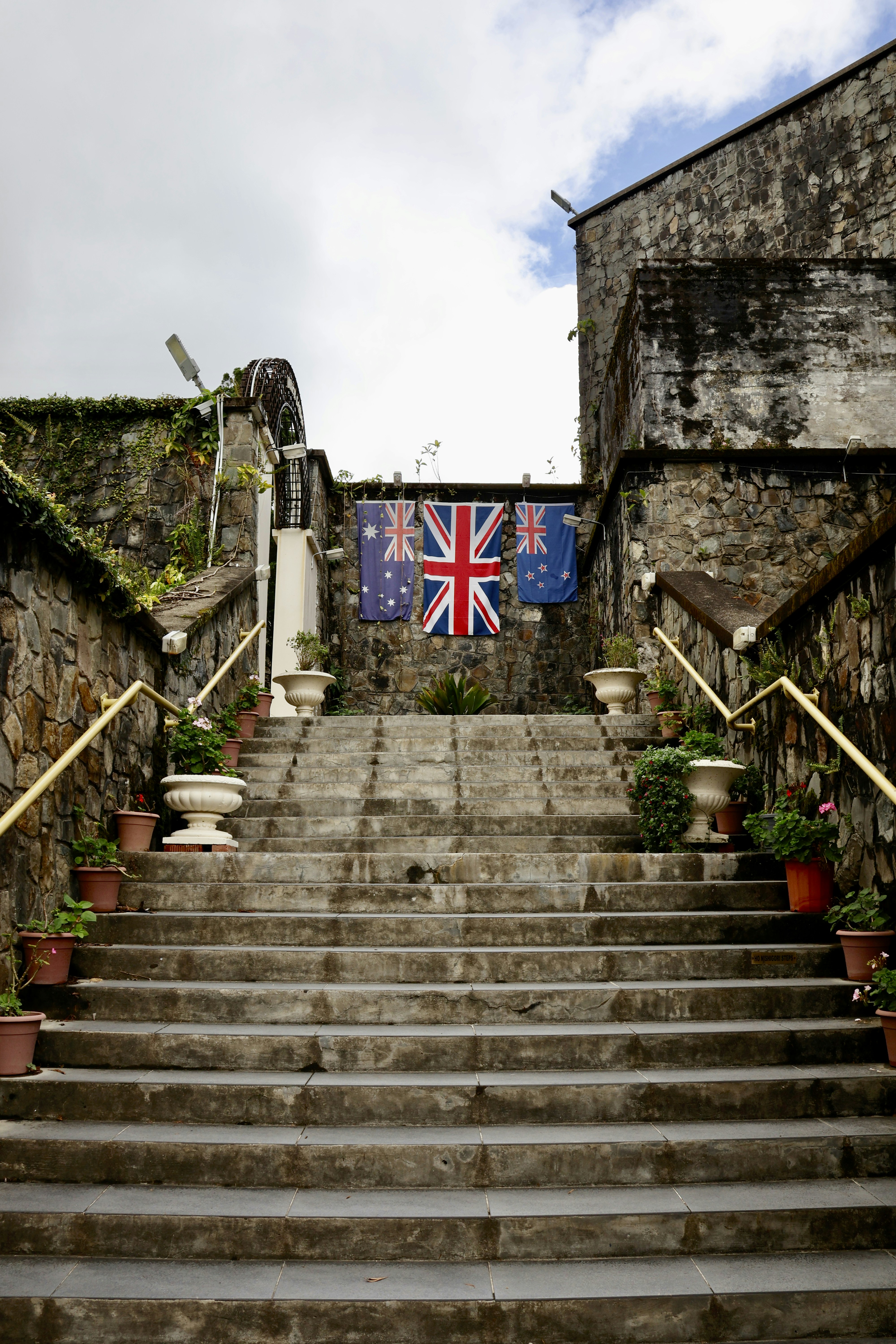 Flagged Staircase: A Colonial Courtyard Leads to a Union of Flags