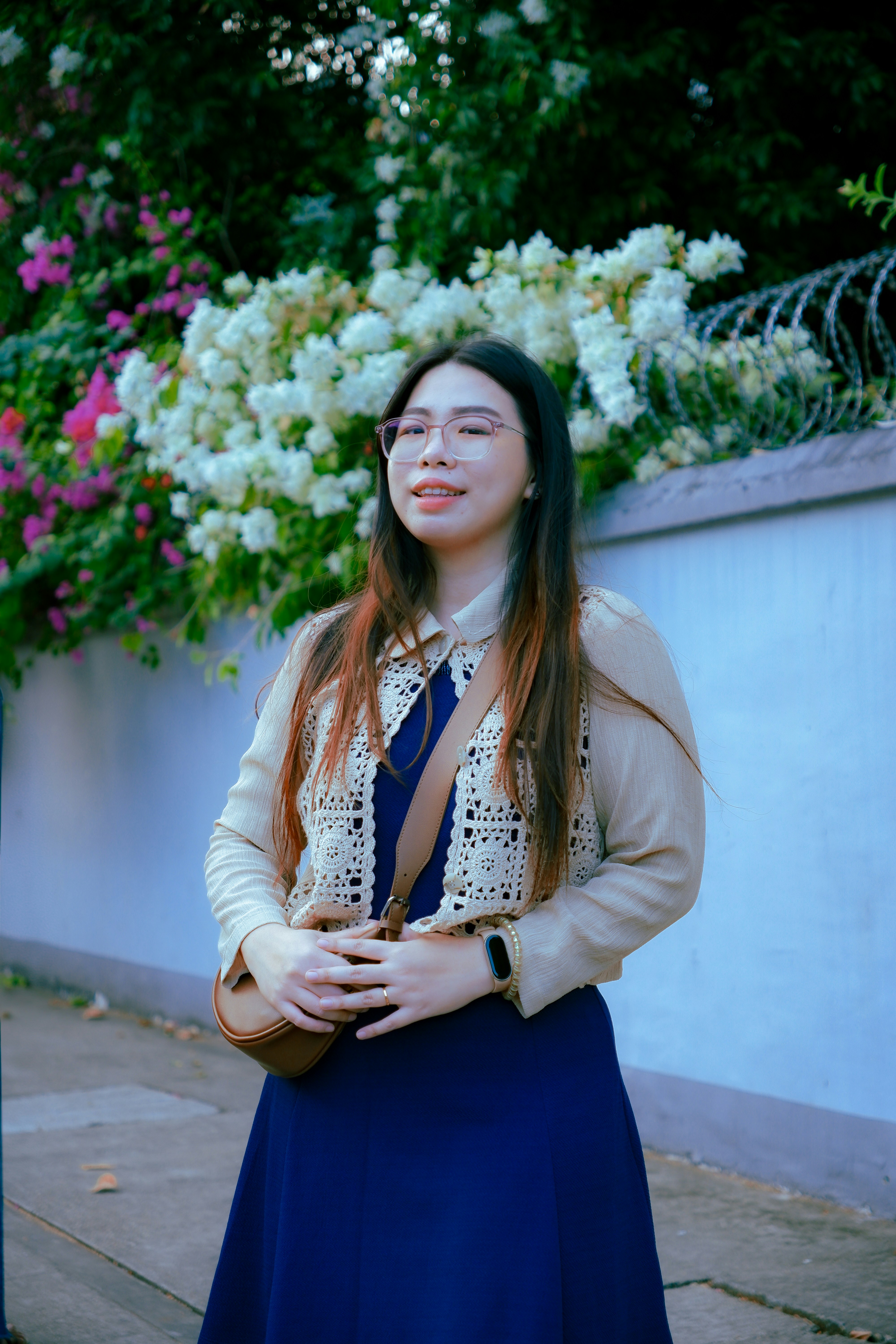 Portrait in Bloom: Soft Focus Against a Garden Backdrop