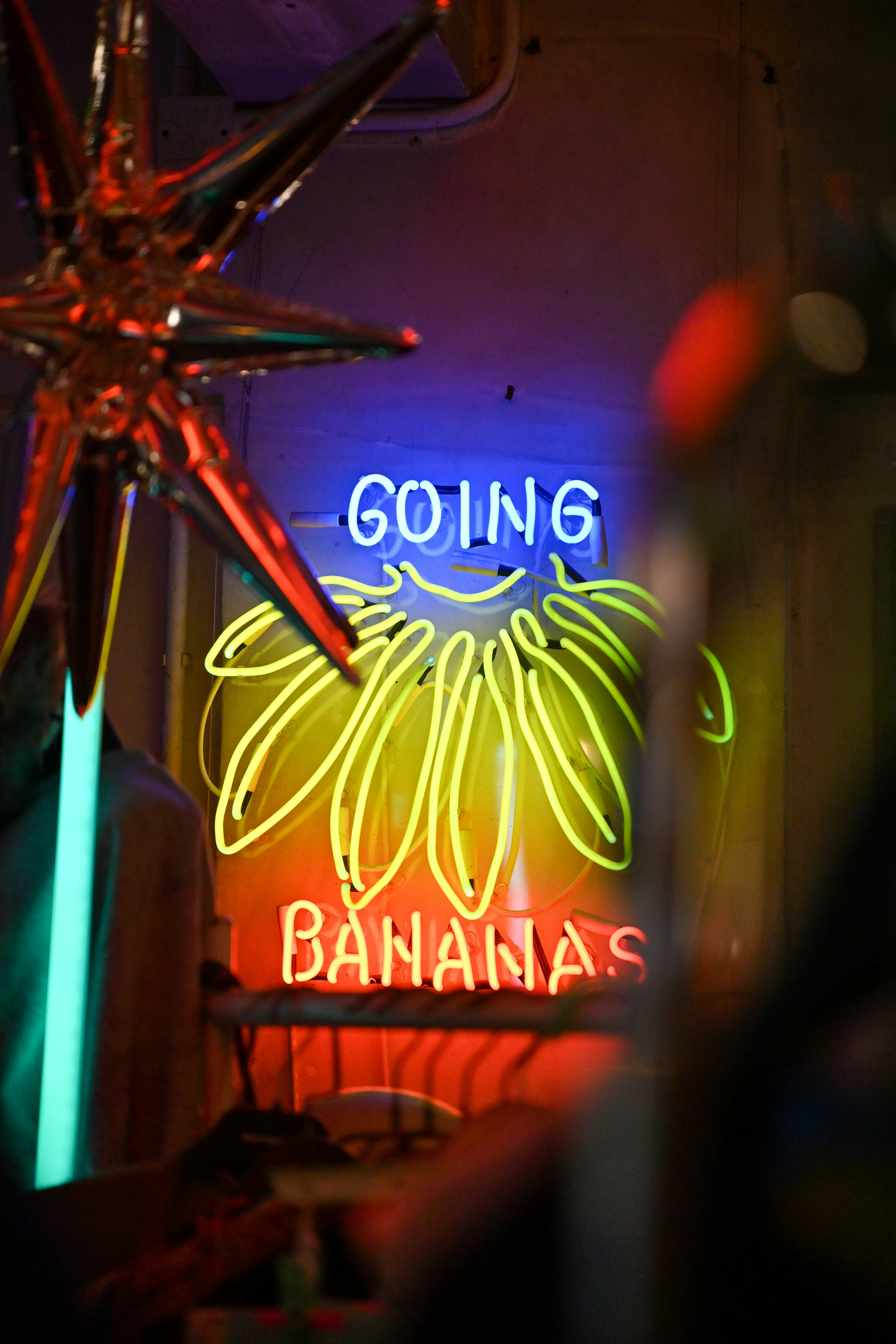Neon Palm Overlays: A Night at the Banana Sign