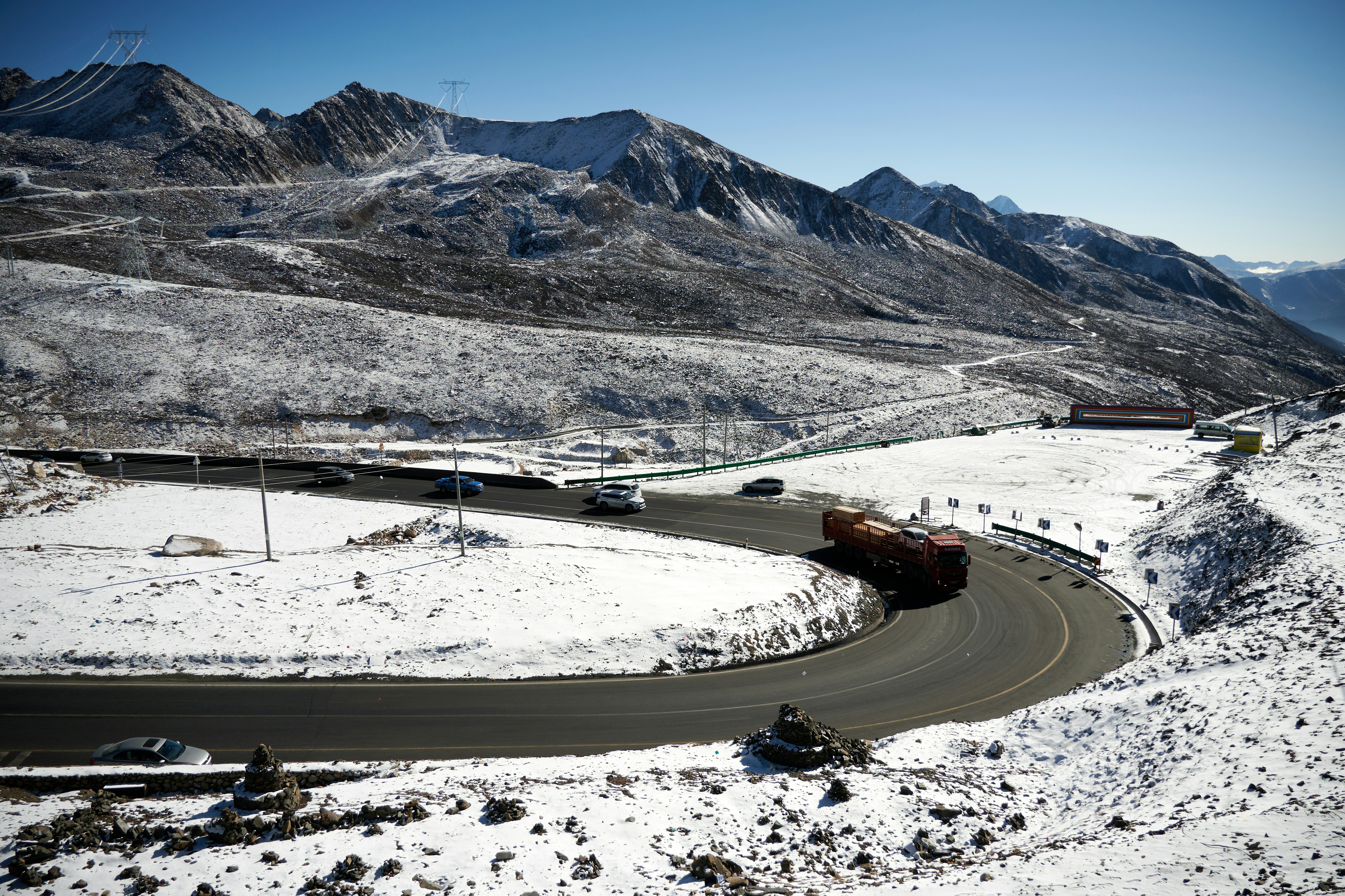 Snowbound Switchback Under Alpine Peaks