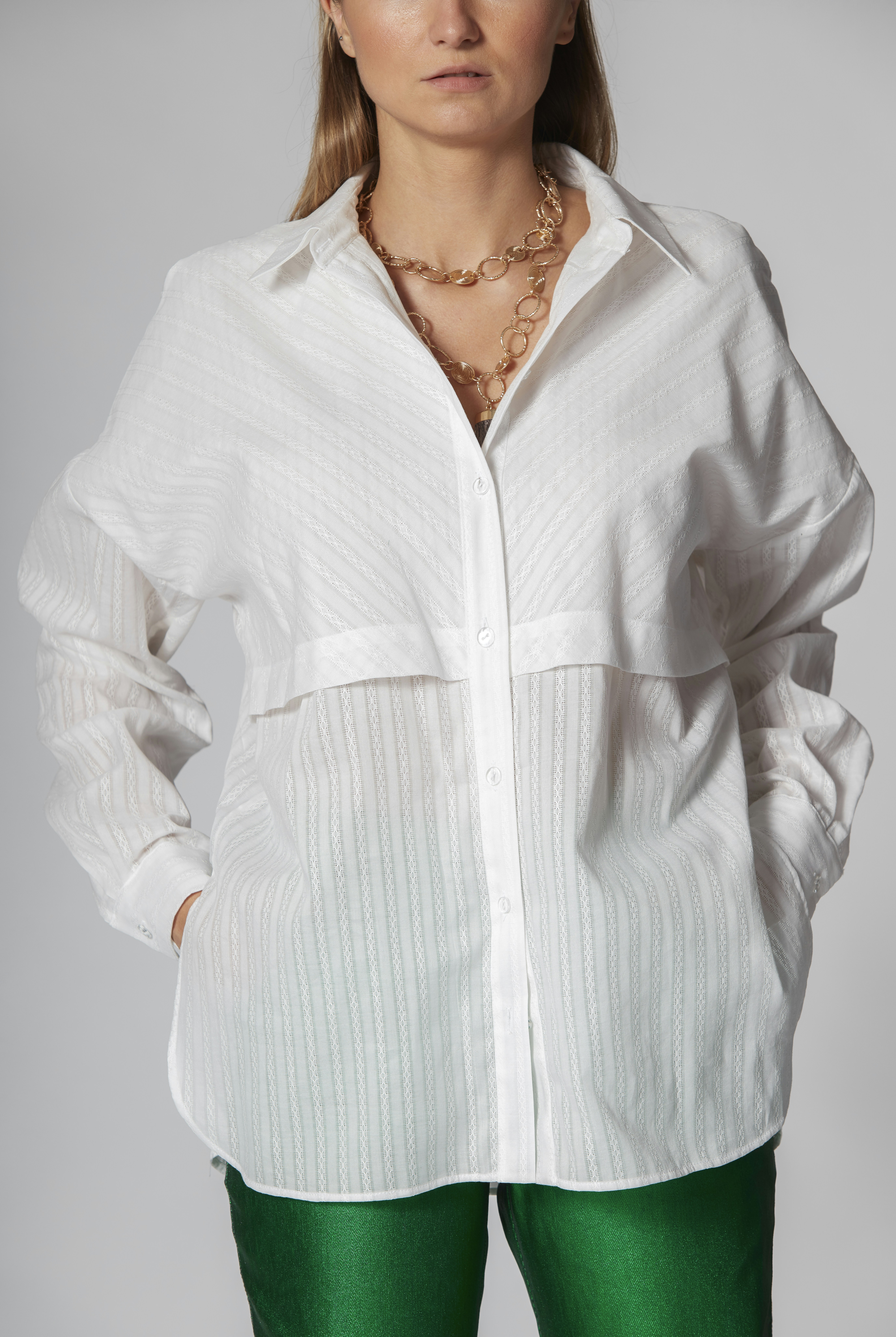 White shirt, bold stance: a portrait of quiet confidence