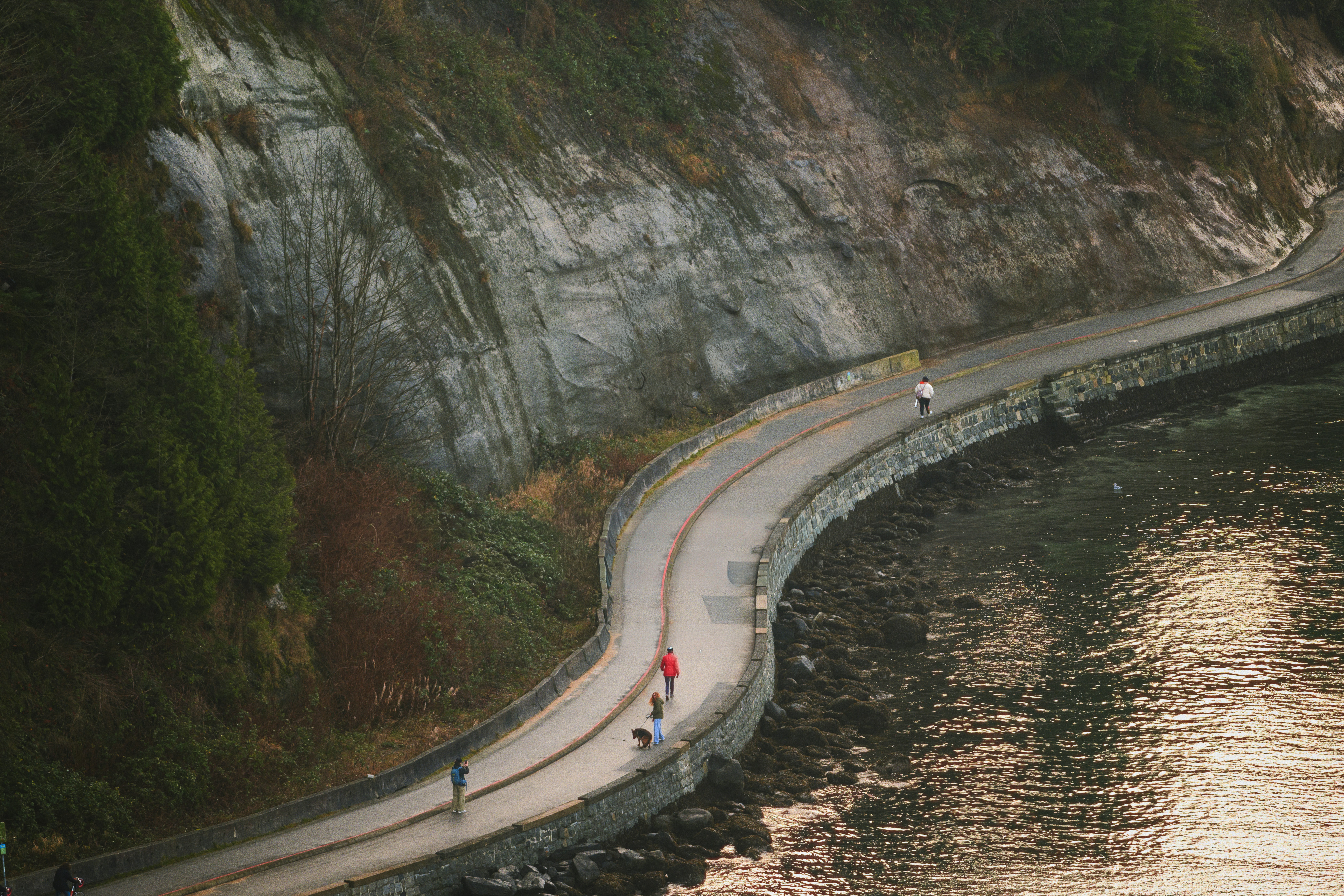 Curved Promenade: Life Along the Riverbank