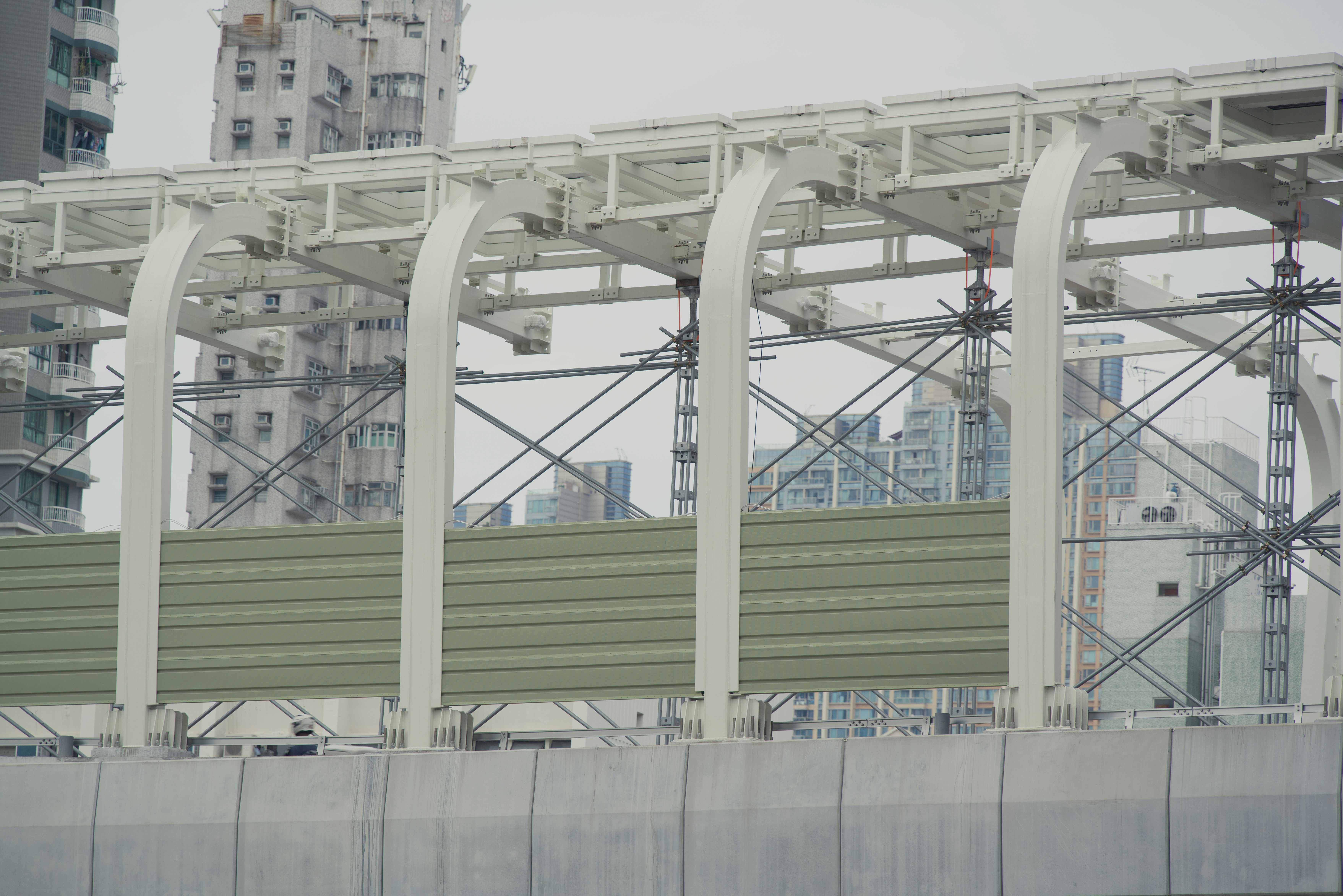 Industrial Arc: Concrete Bridges and Suspended Scaffolding
