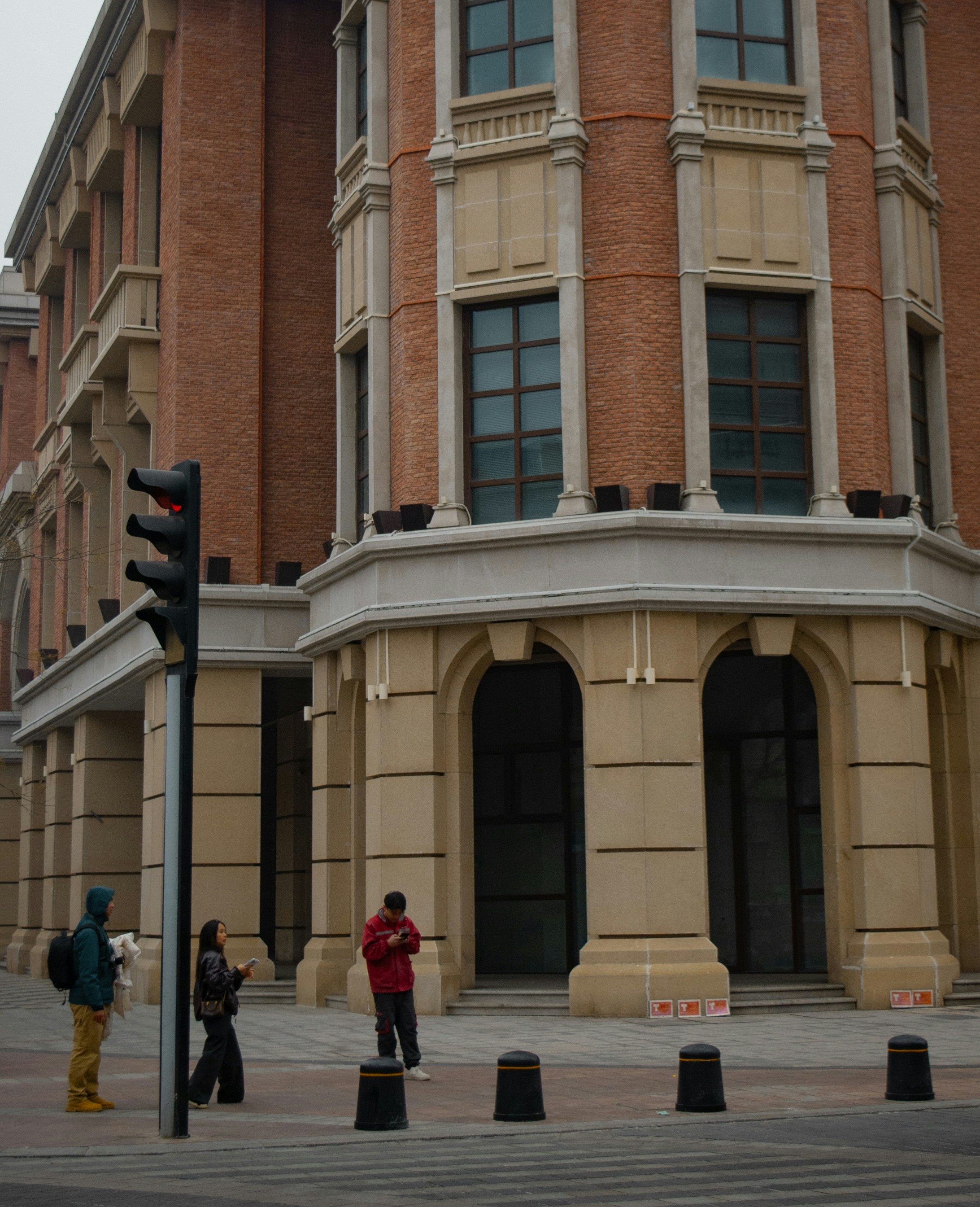 Urban Streetfront: A Red-Jacket Moment at the Corner of Architecture