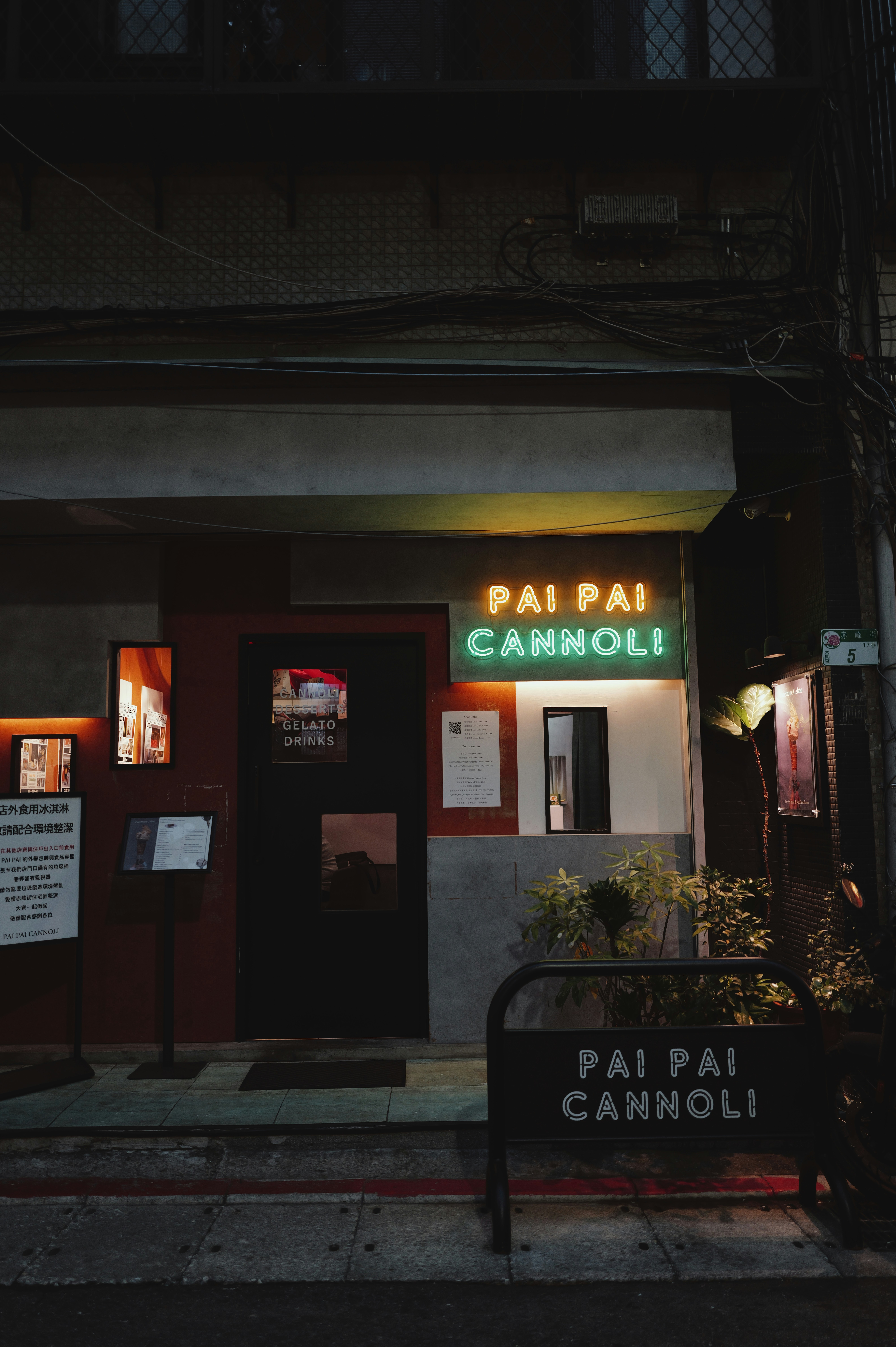 Neon Signage Over a Quiet Night Café