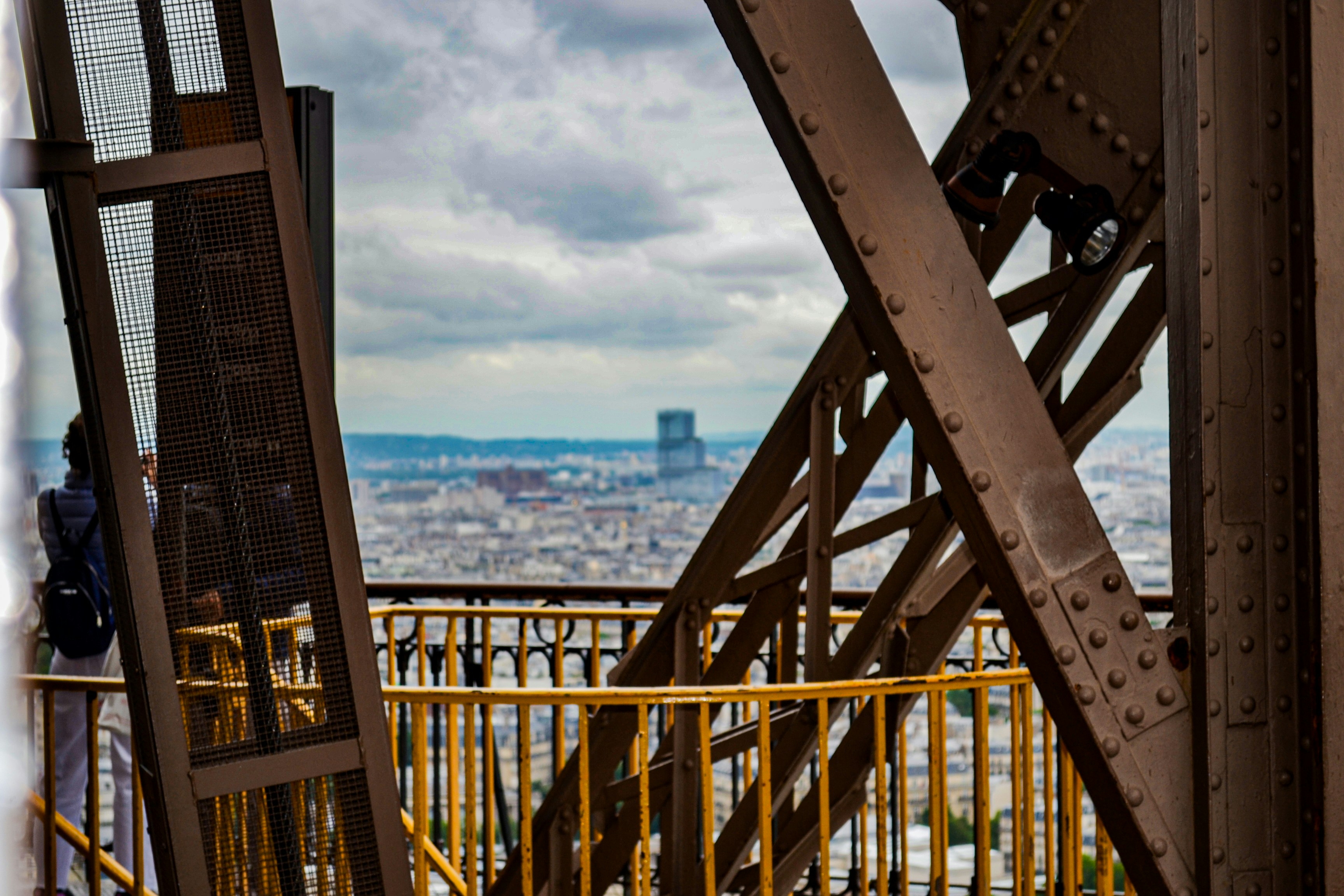 Crossed Iron: City Skyline Framed by Tower Structure