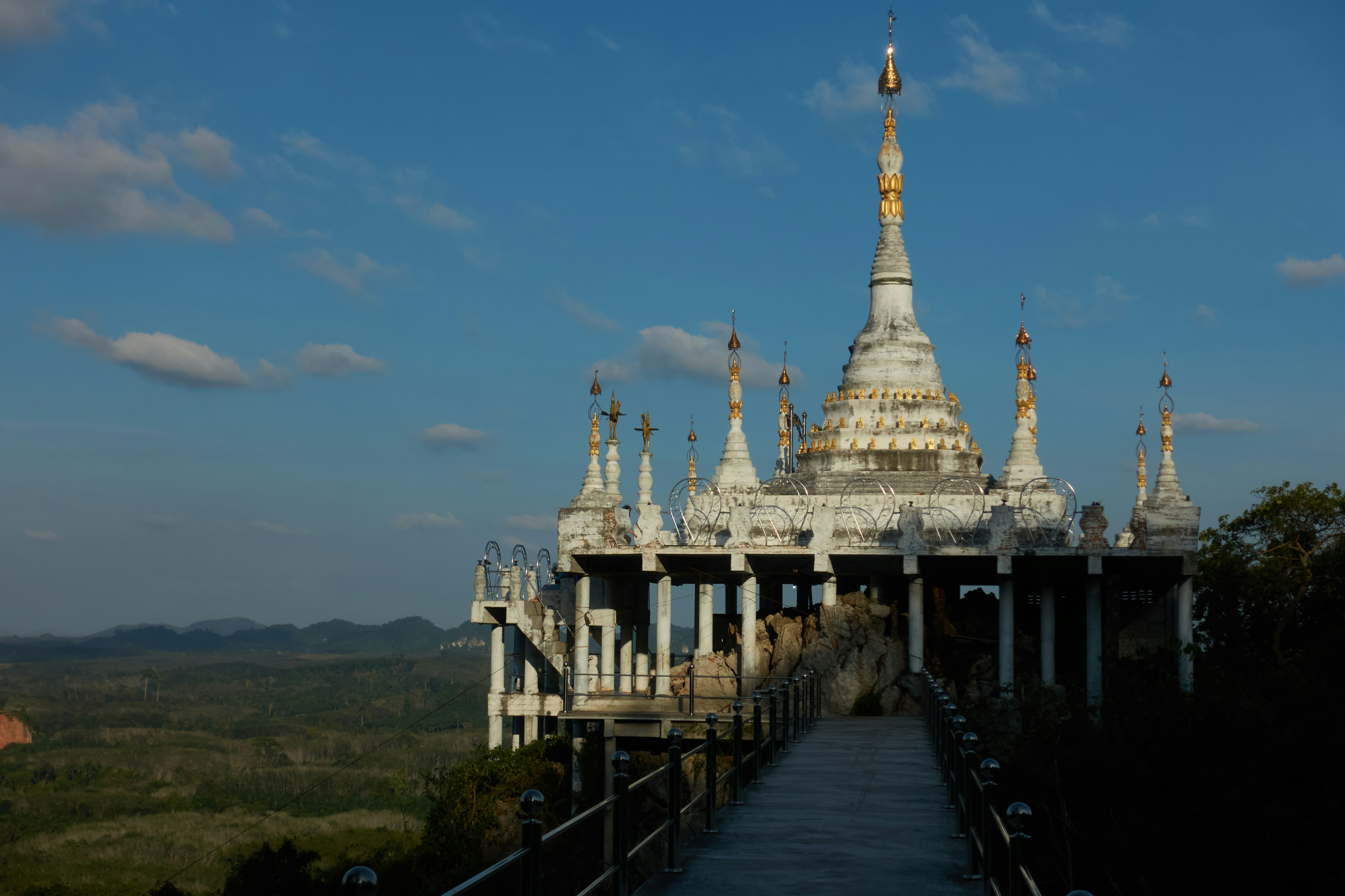 Silhouette of a Summit Temple Amid a Vast Plain