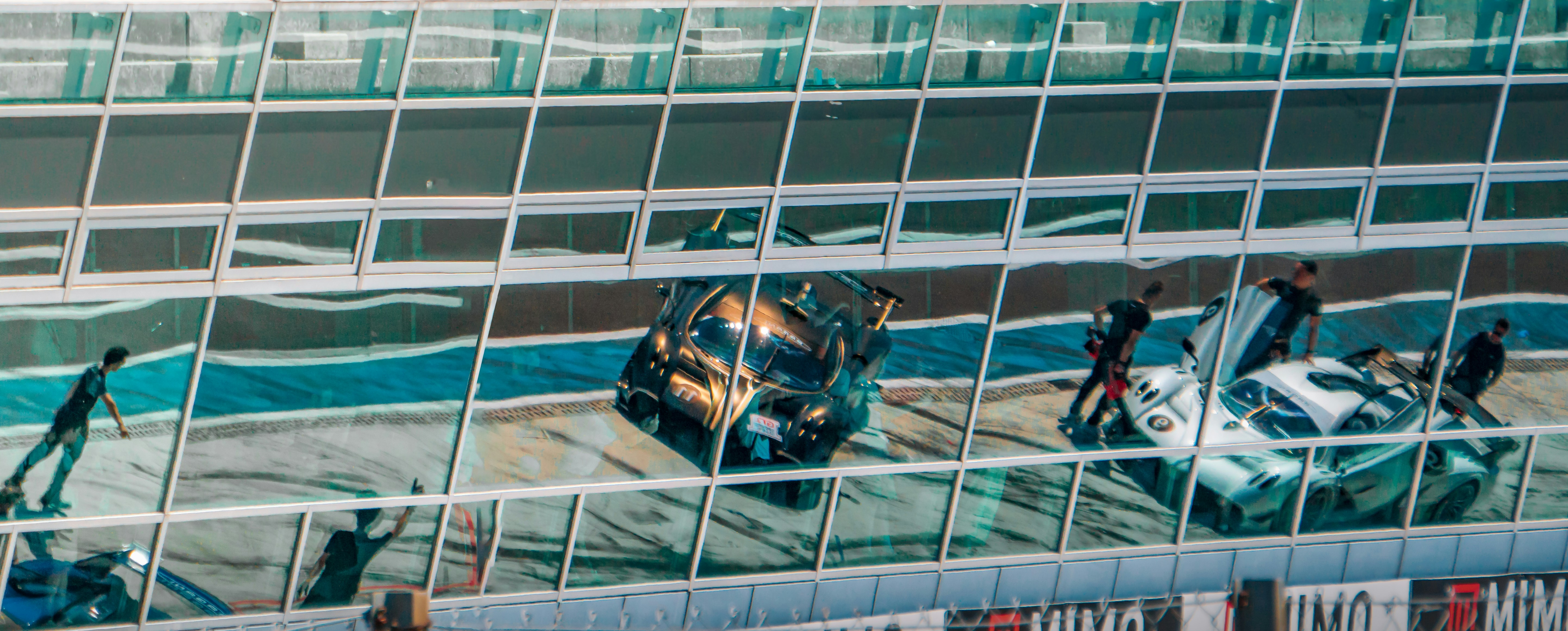 Reflections on the Glass: Aerial Scene of a Bridgeside Standoff