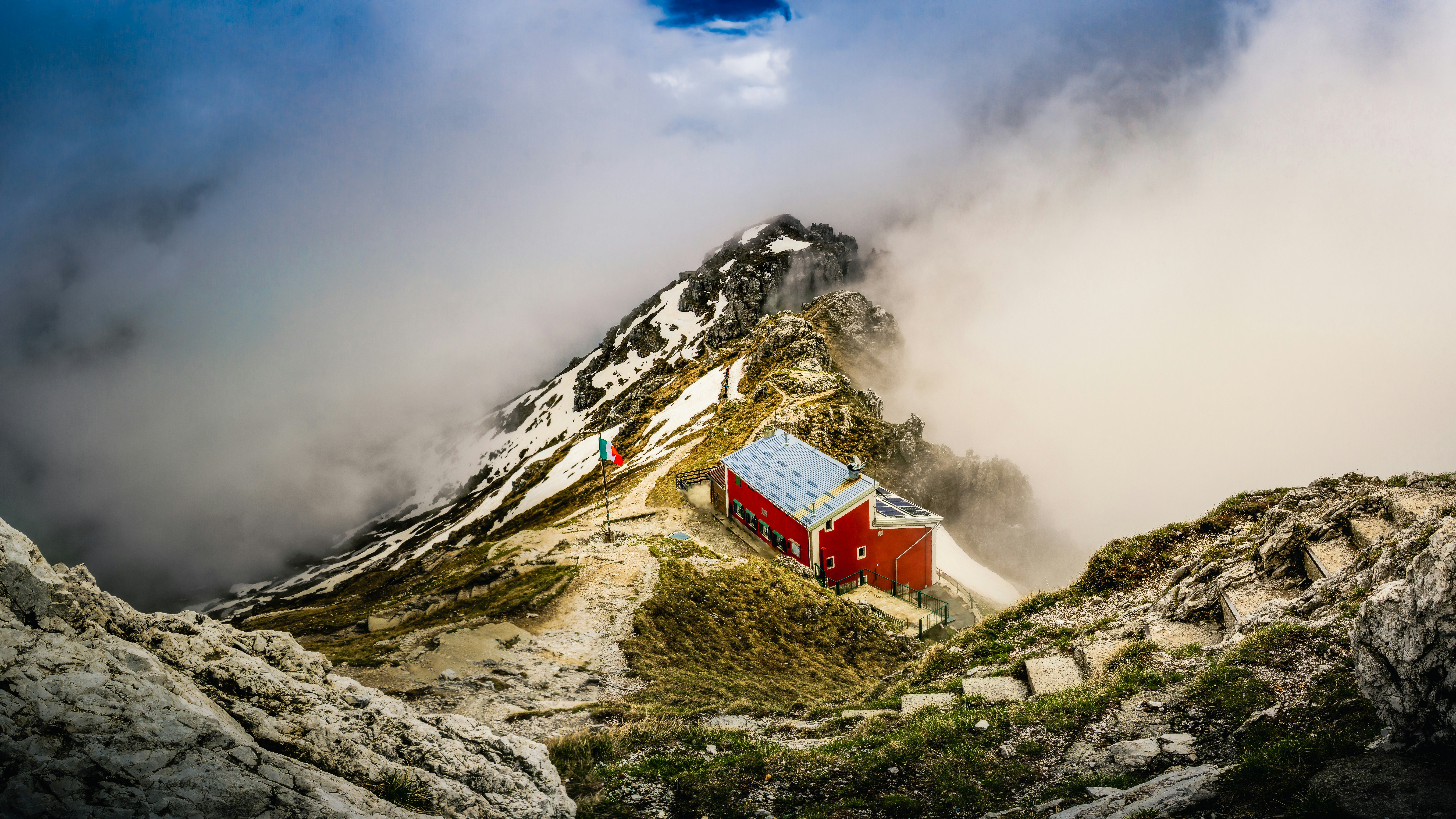 Red Mountain Refuge Nestled in Sea of Clouds