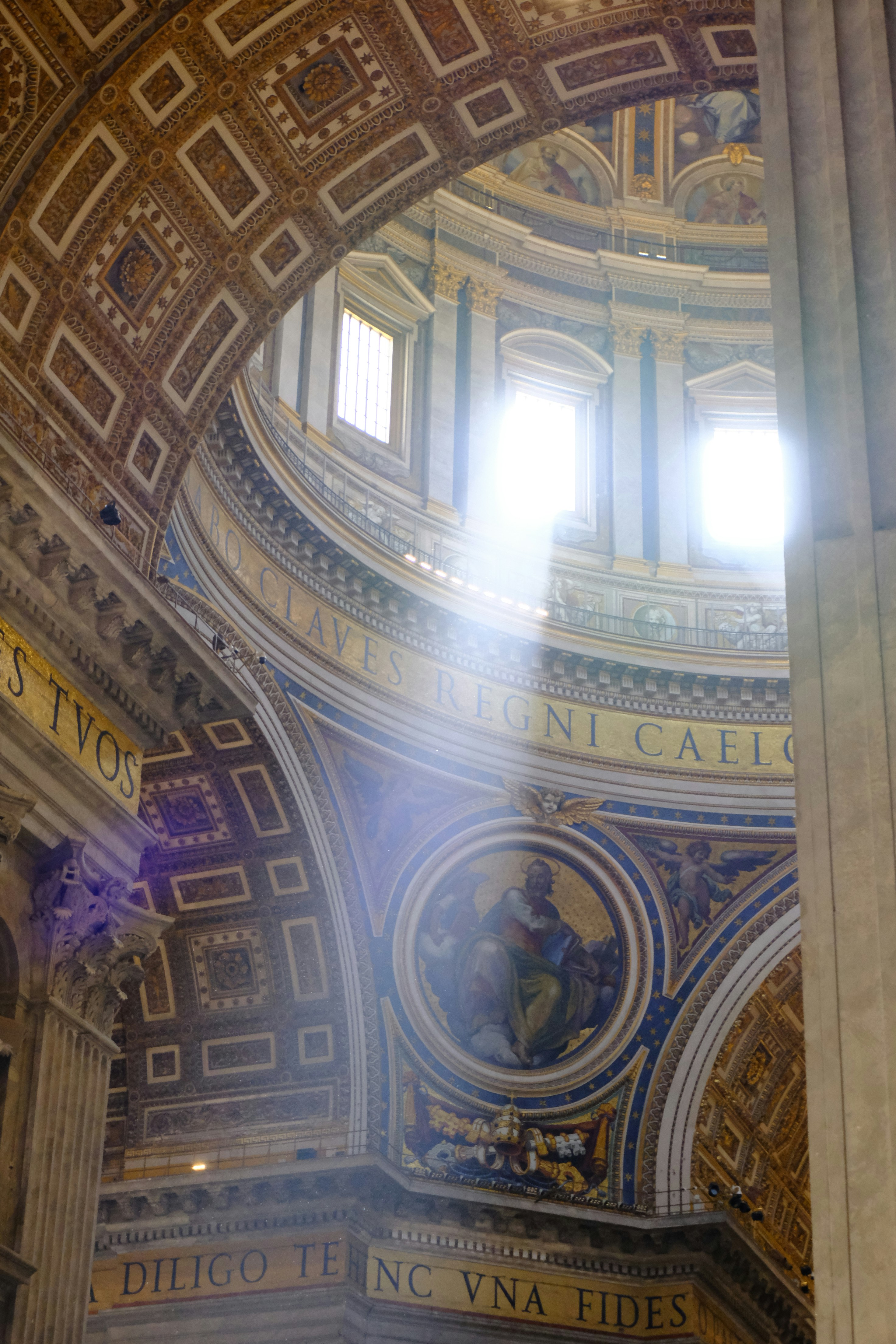 Sunbeam Through Sacred Dome: Light Resting on an Ornate Ceiling