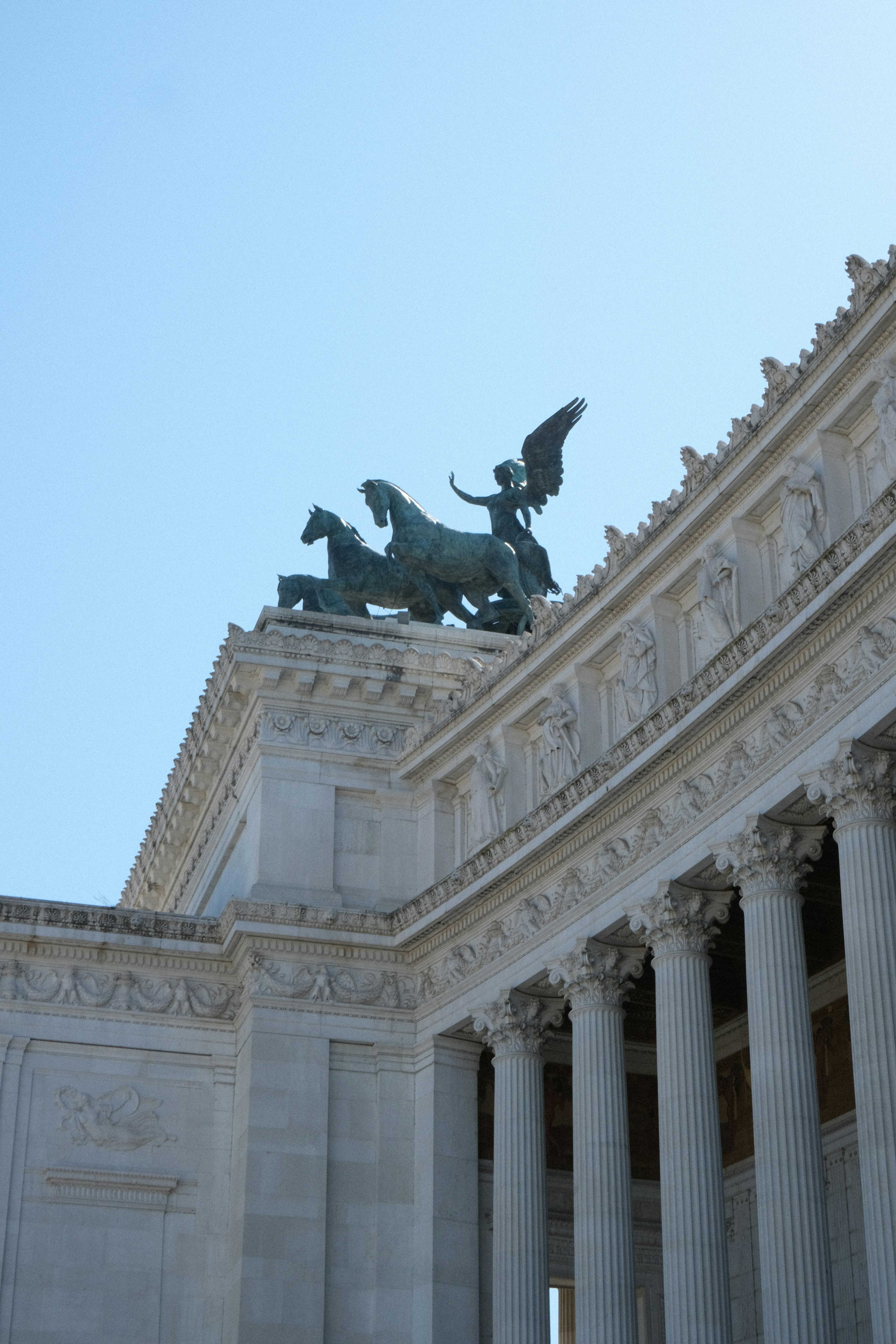 Statue of winged victory with horses atop building photo – Free ...
