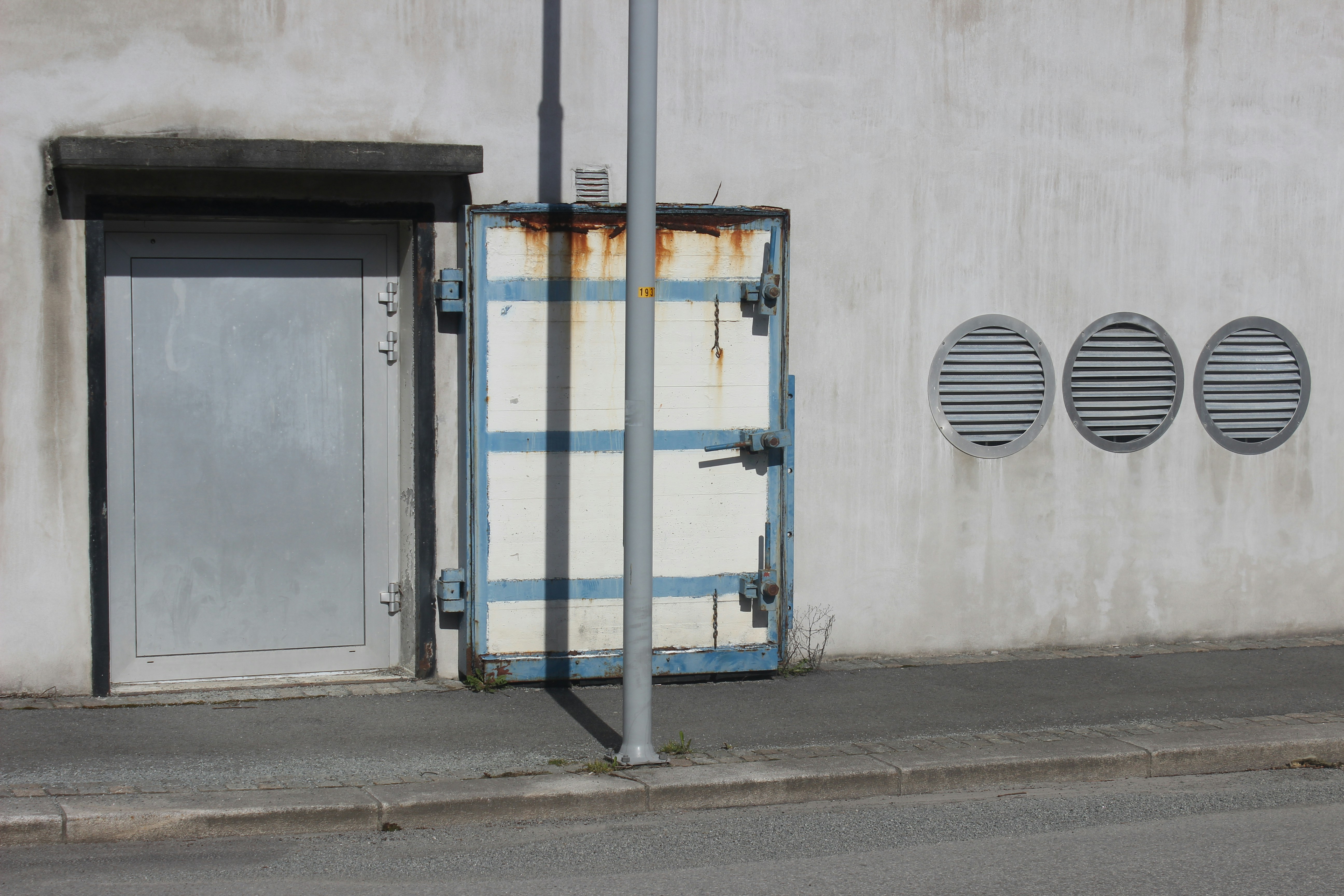 Rust and doors by the curbside