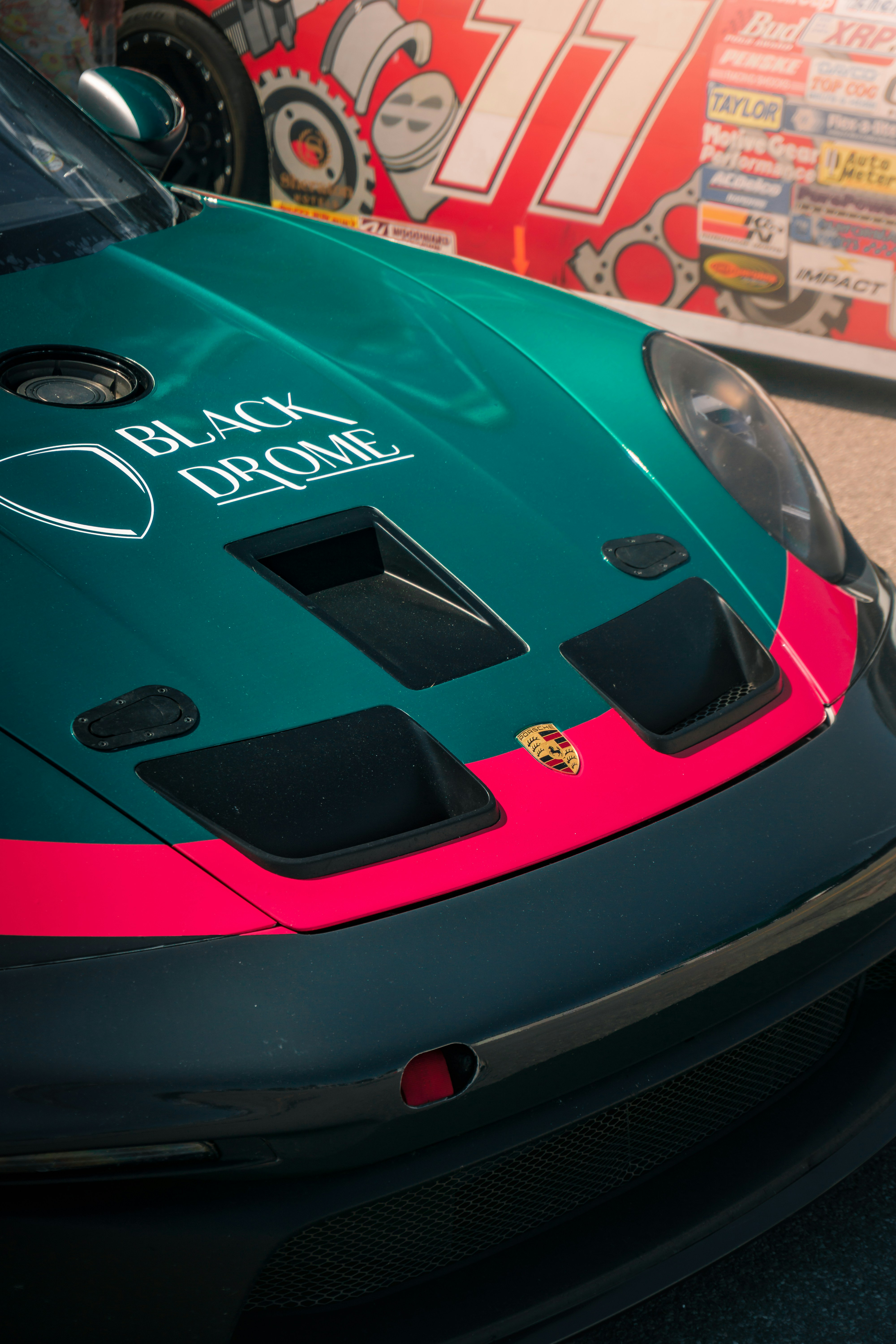 Teal Porsche Power: The Race Car Close-Up