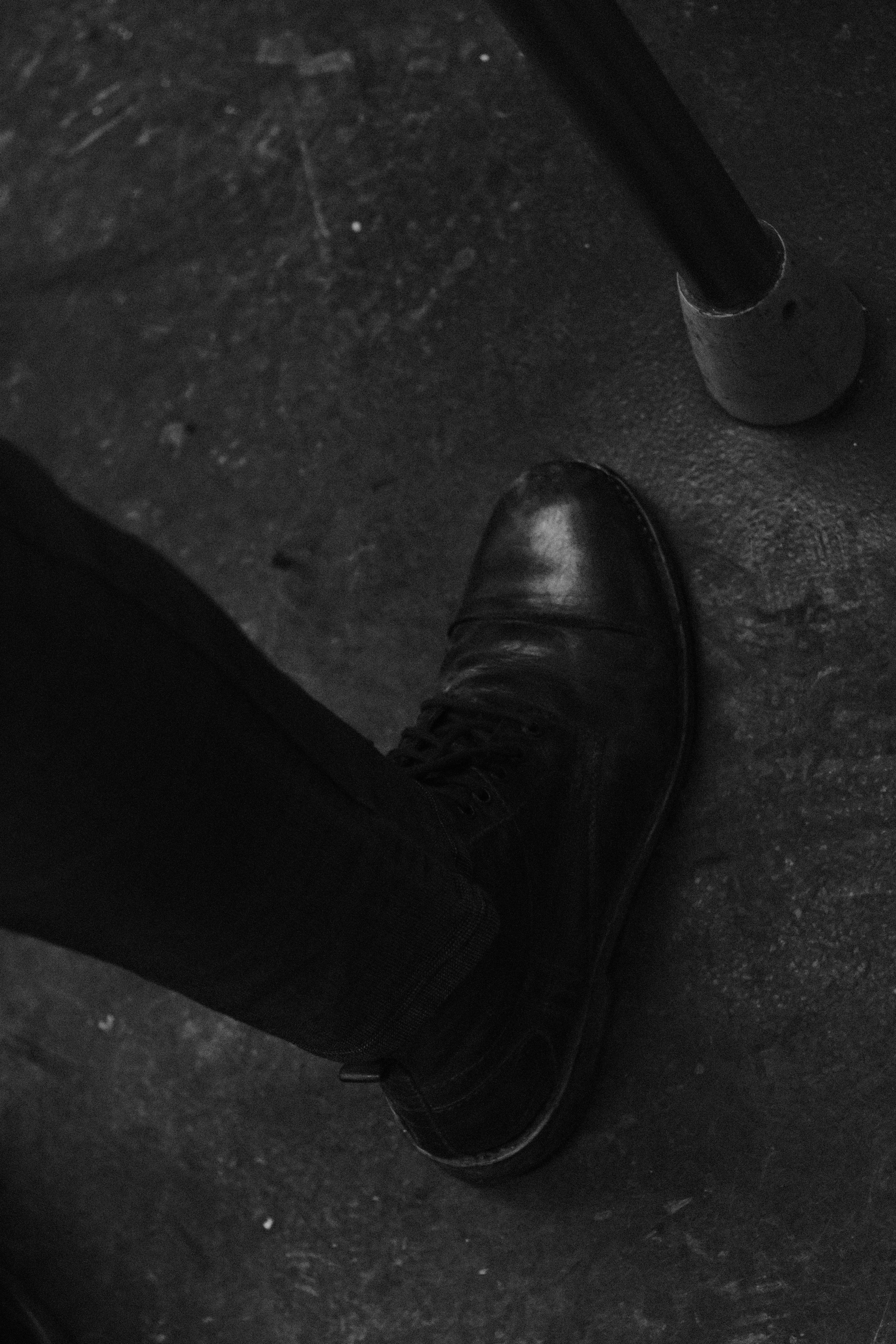 Footstep in the Shadows: A Sole on the Edge of the Bench