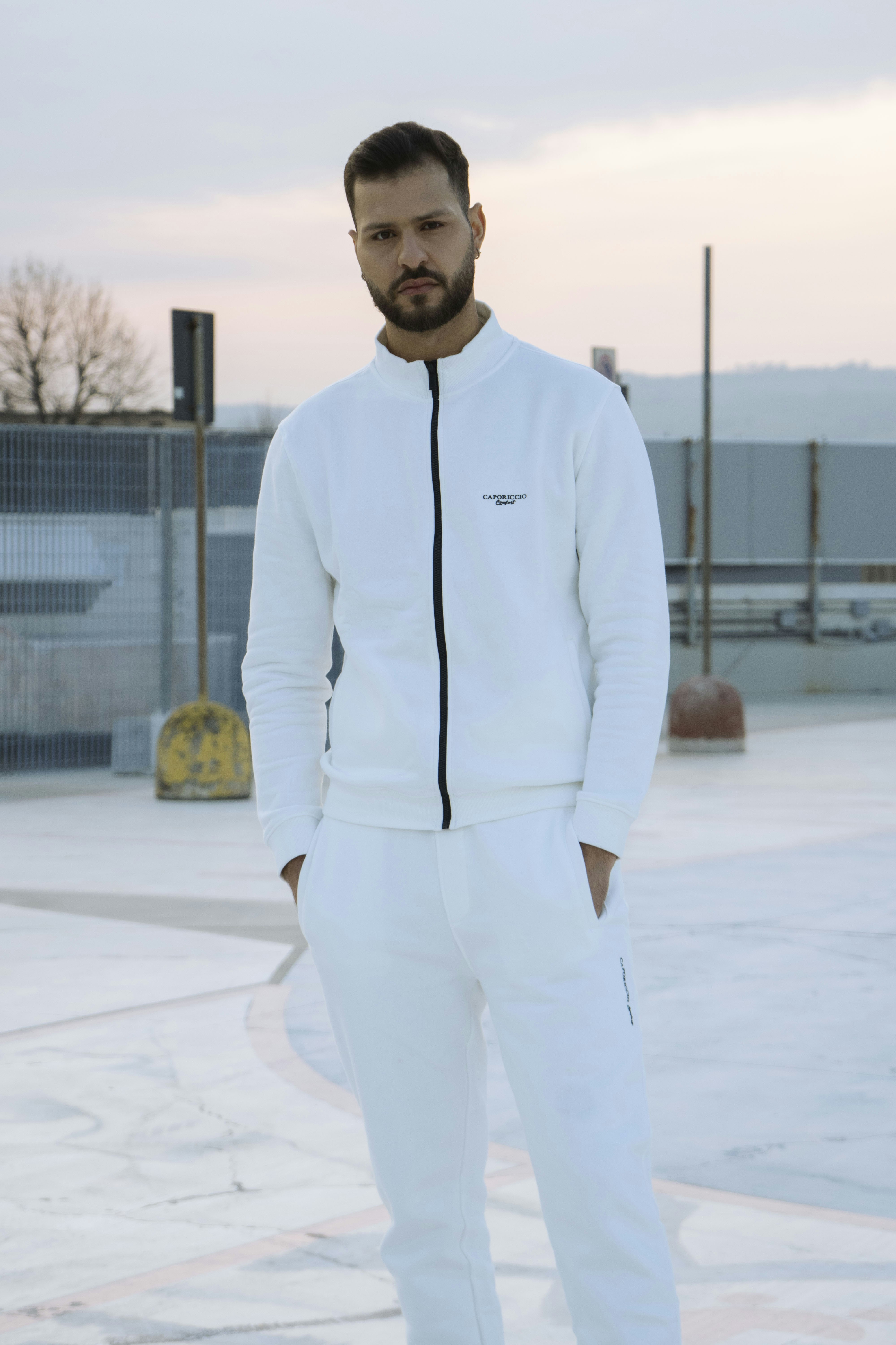 Mono-chrome Calm: A suited silhouette on a rooftop