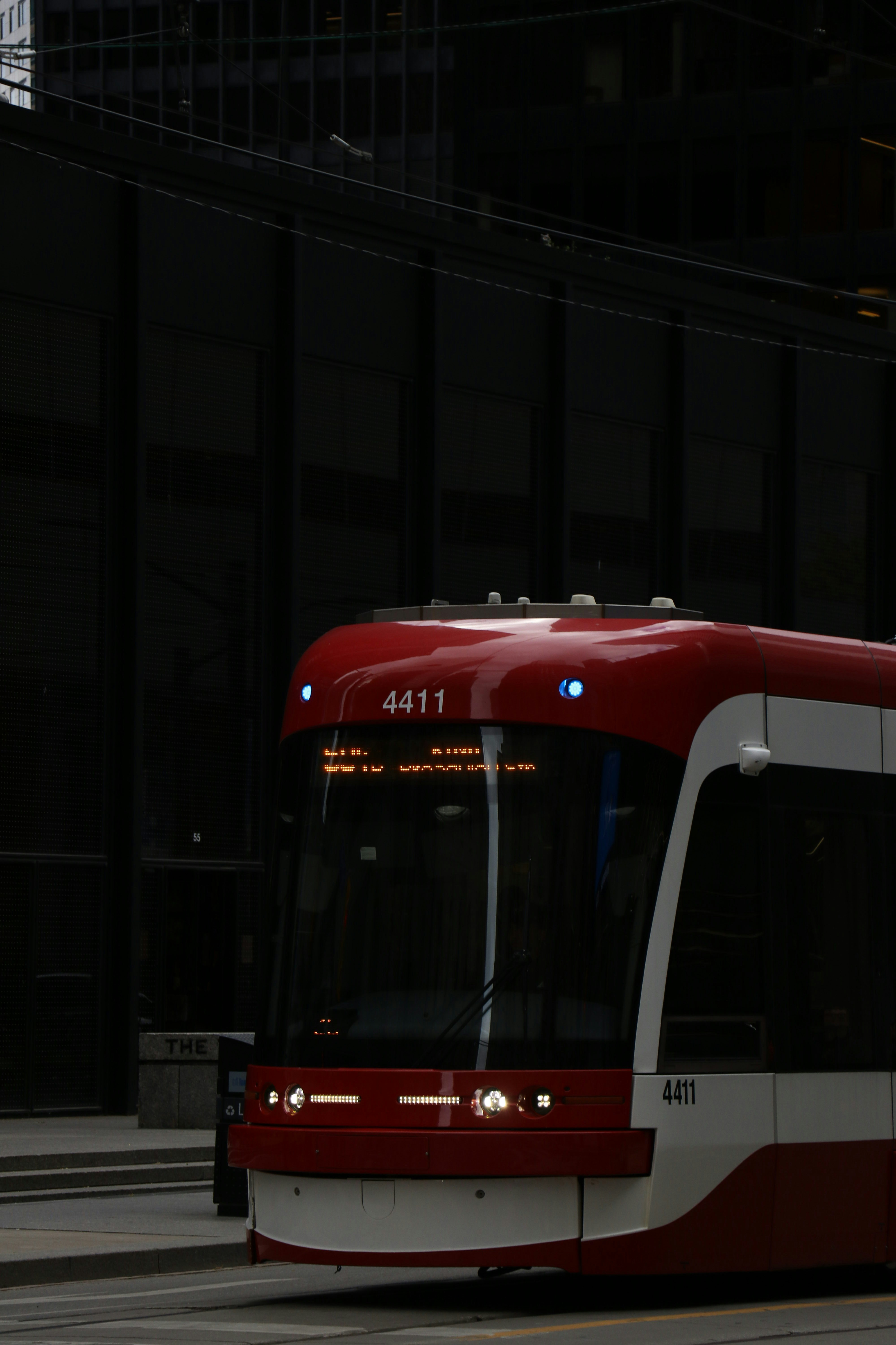 Red Metro: A City Train Emerges from the Night