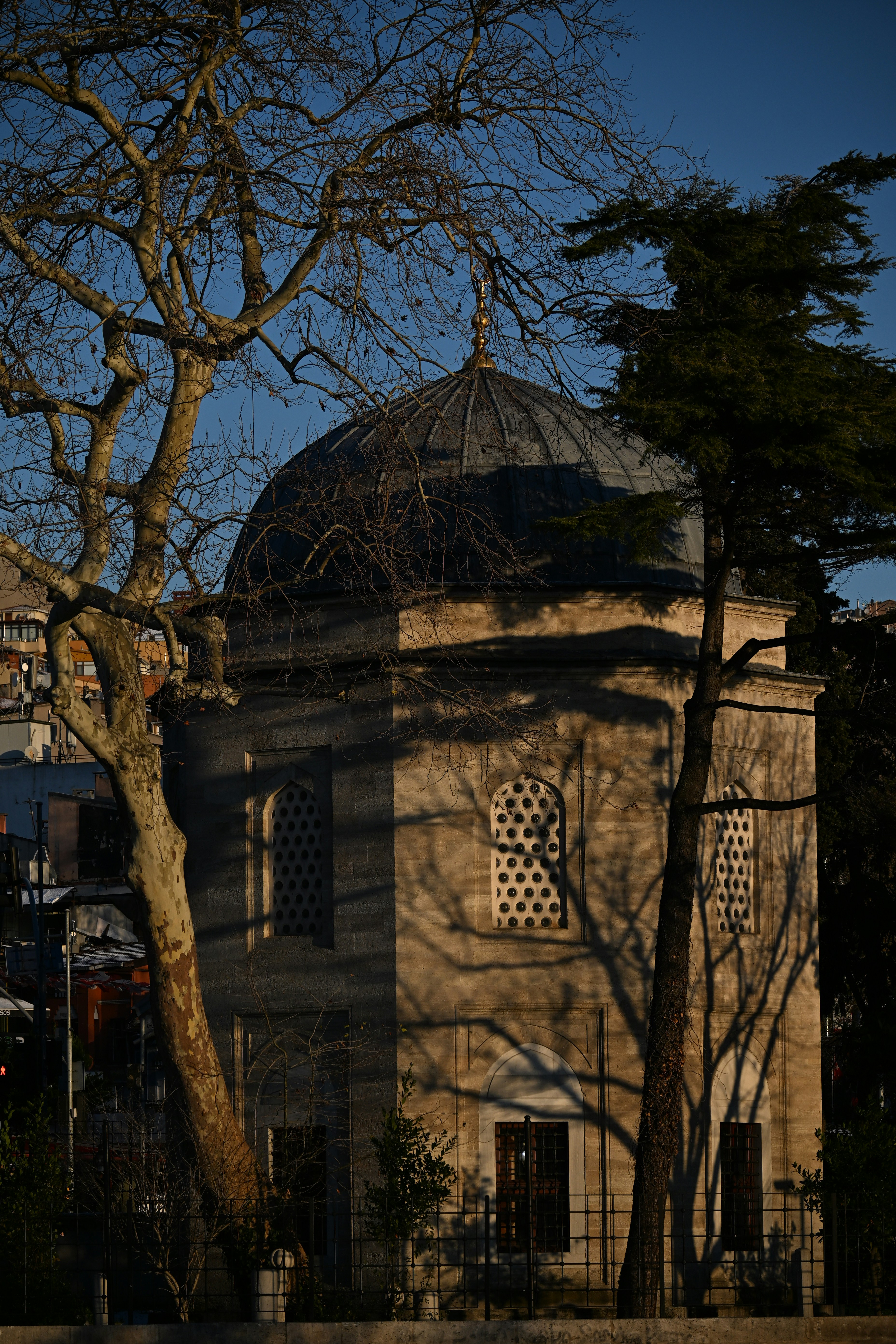 Dome and Dappled Shadows: Evening Light on a Historic Shrine