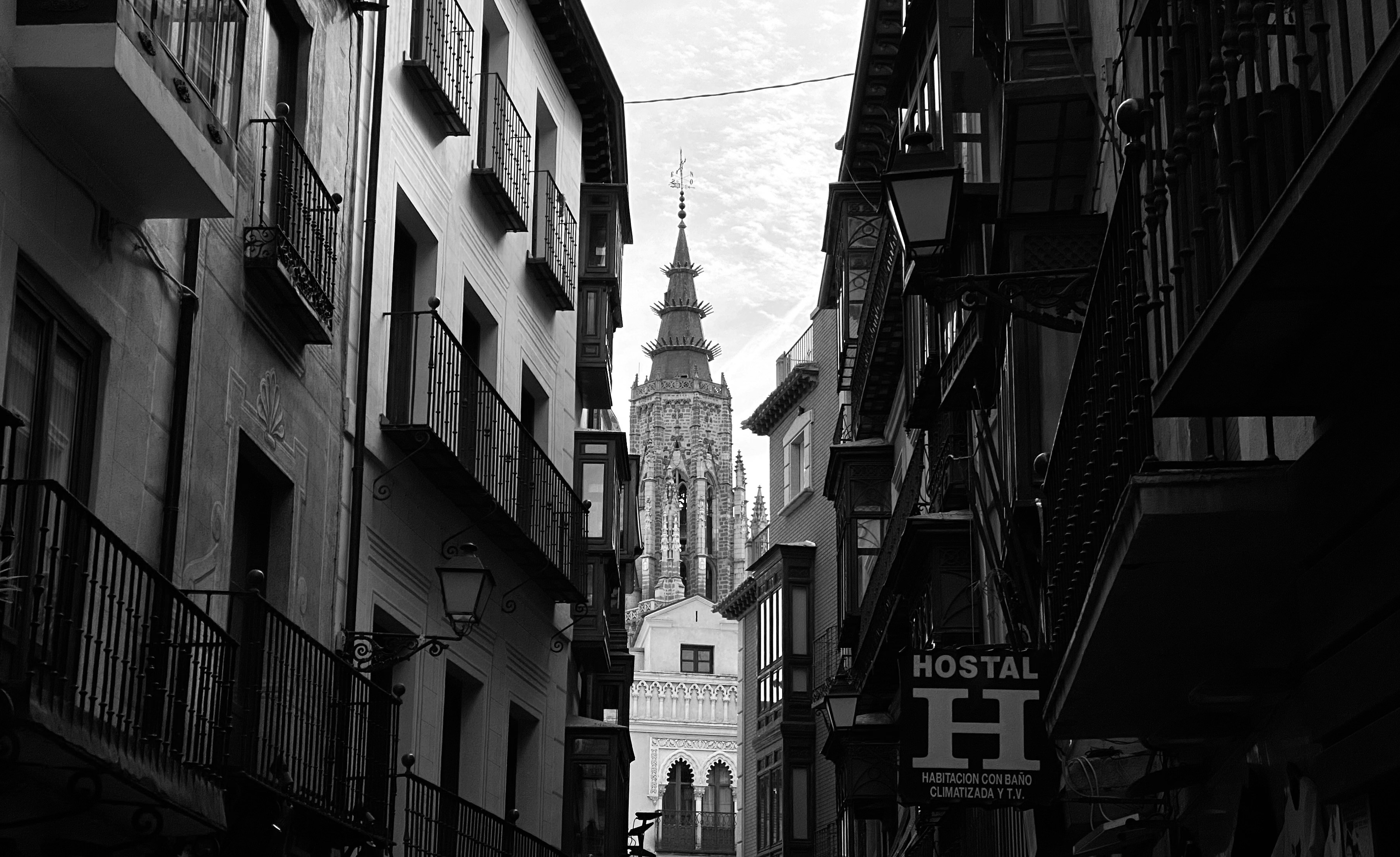 Narrow Street to the Spire: A Quiet Ascent
