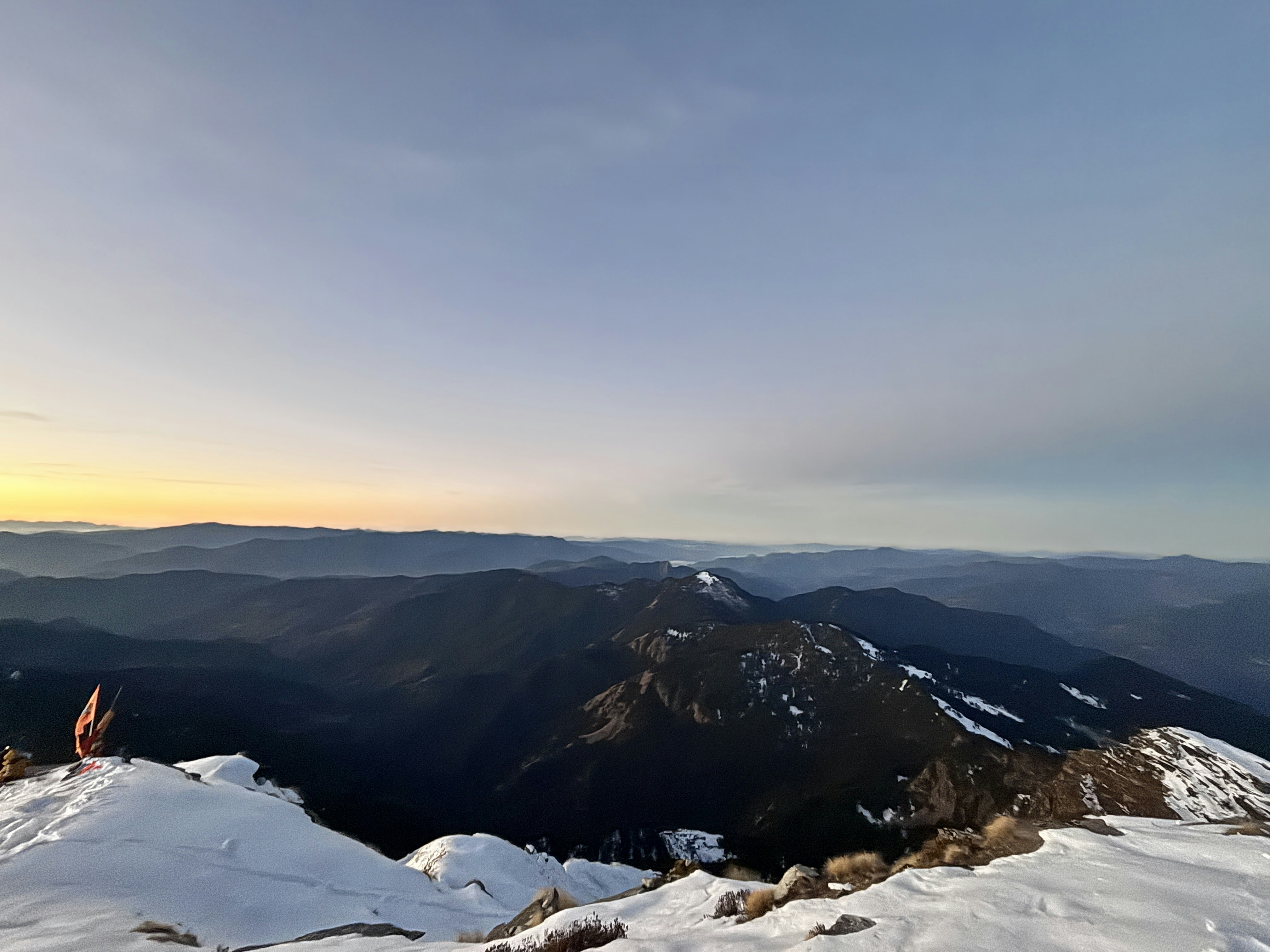 Dawn Over Snow-Capped Ridges
