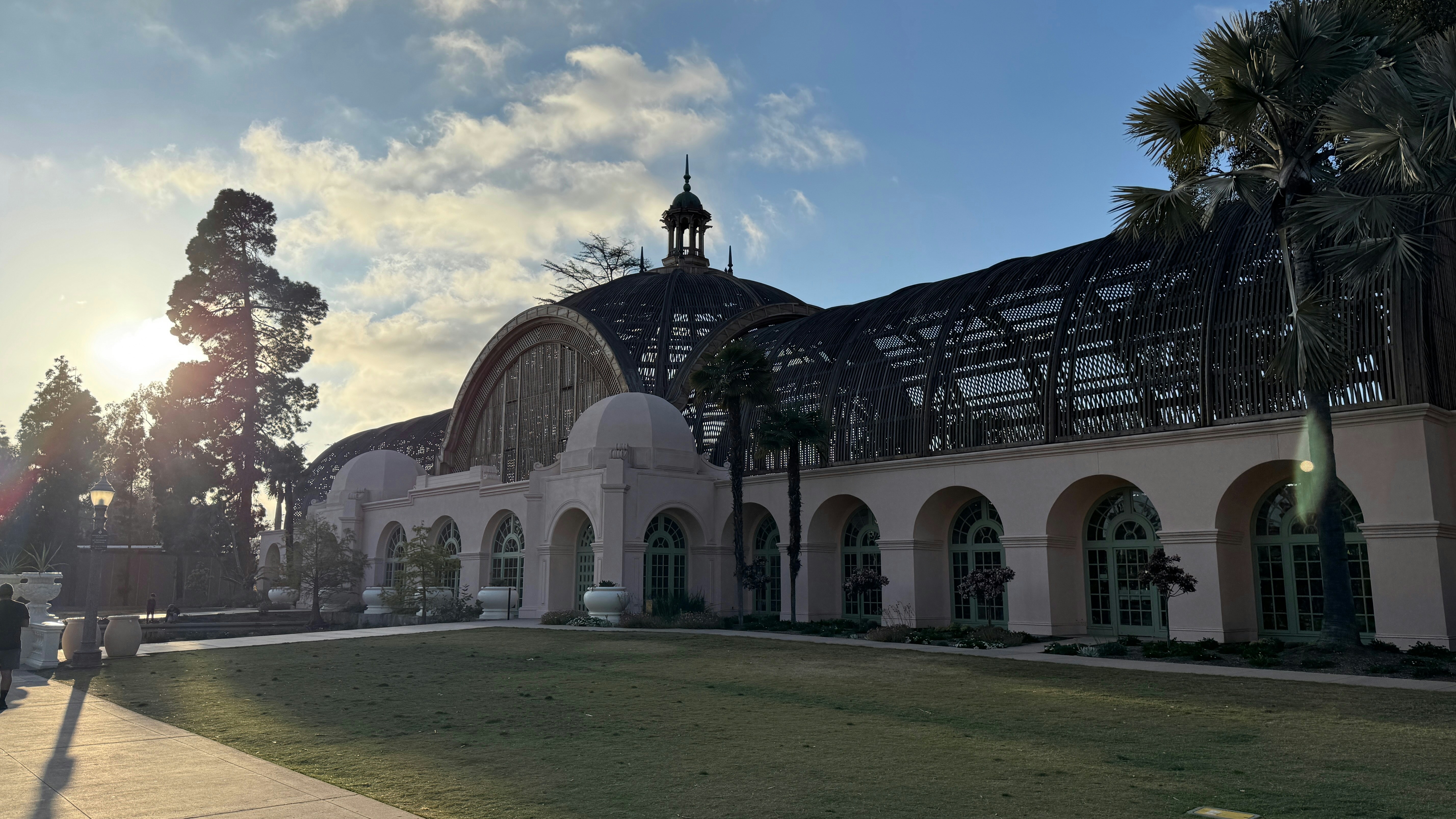 Sunrise Over Glass Atria: A Serene Courtyard at the Conservatory
