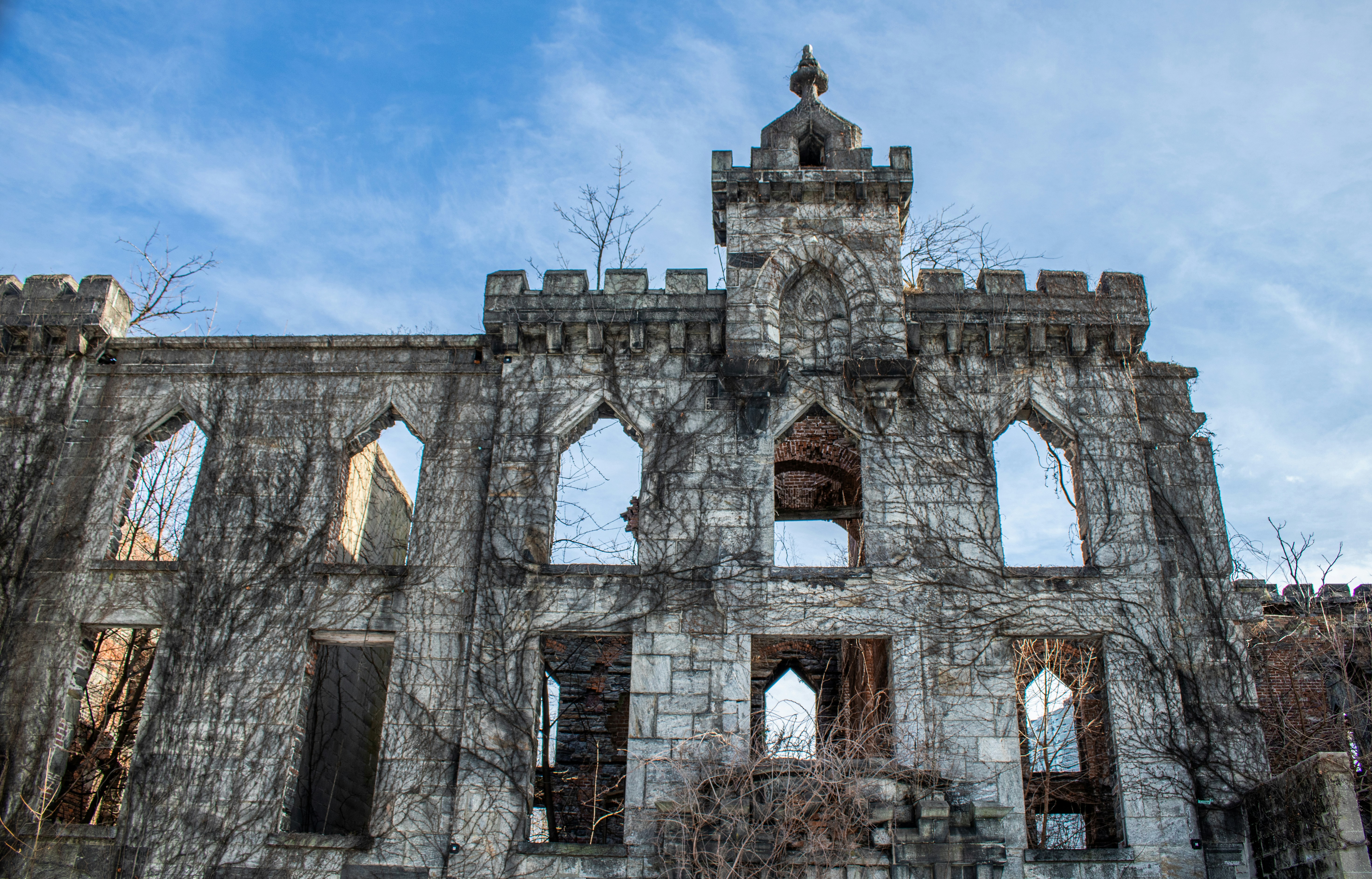 A photograph of the exterior facade of the Smallpox Memorial Hospital, showing the historic hospital building. The Smallpox Hospital, sometimes referred to as the Renwick Smallpox Hospital and later the Maternity and Charity Hospital Training School, was a hospital located on Roosevelt Island in Manhattan, New York City. Originally designed by architect James Renwick Jr., the 100-bed hospital opened in 1856, when the area was known as Blackwell's Island. A century after it opened, the hospital was closed, and the building eventually fell into disrepair.