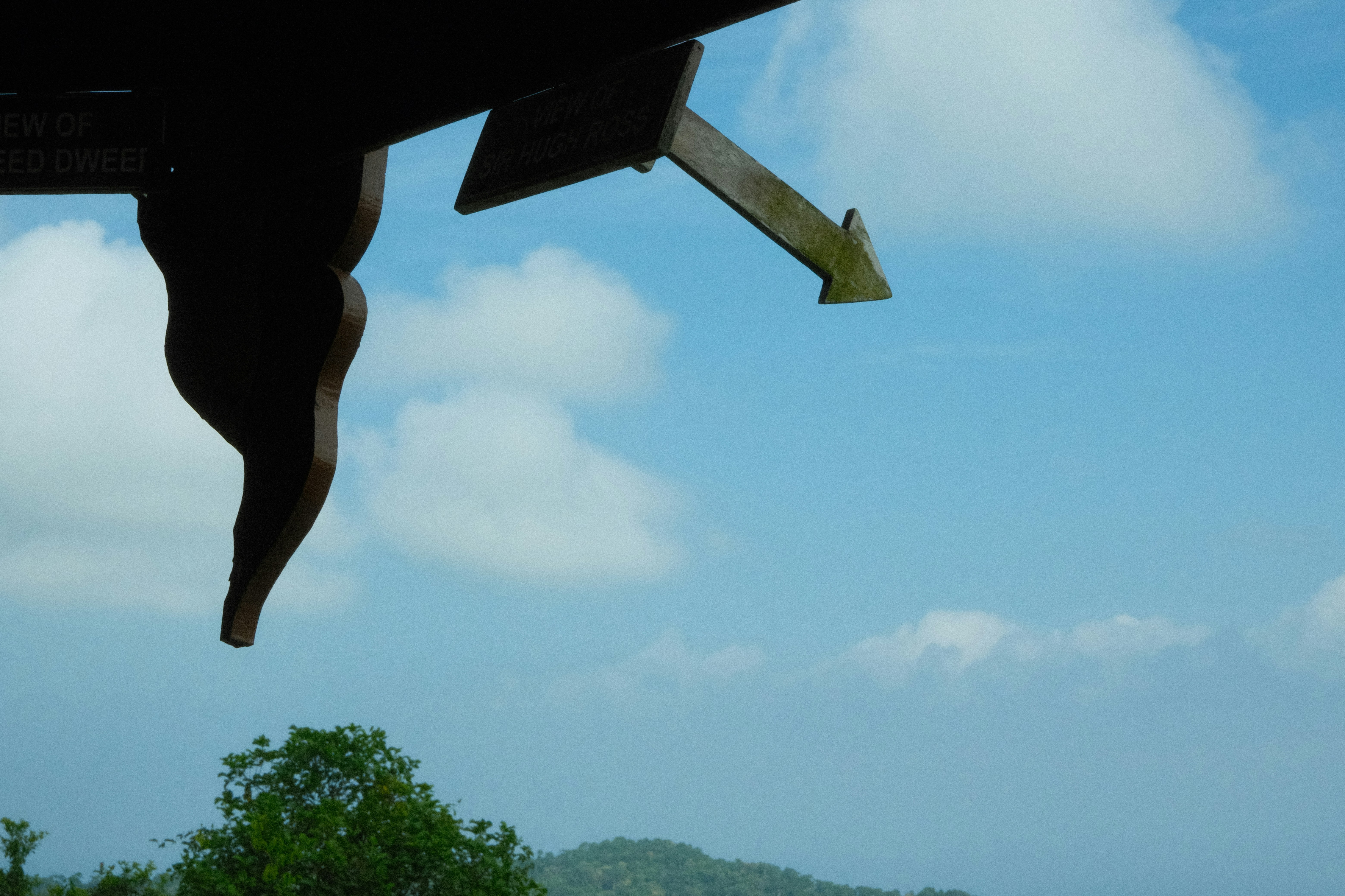 Shadowed Craft: The Roof Tracer Against a Bright Sky