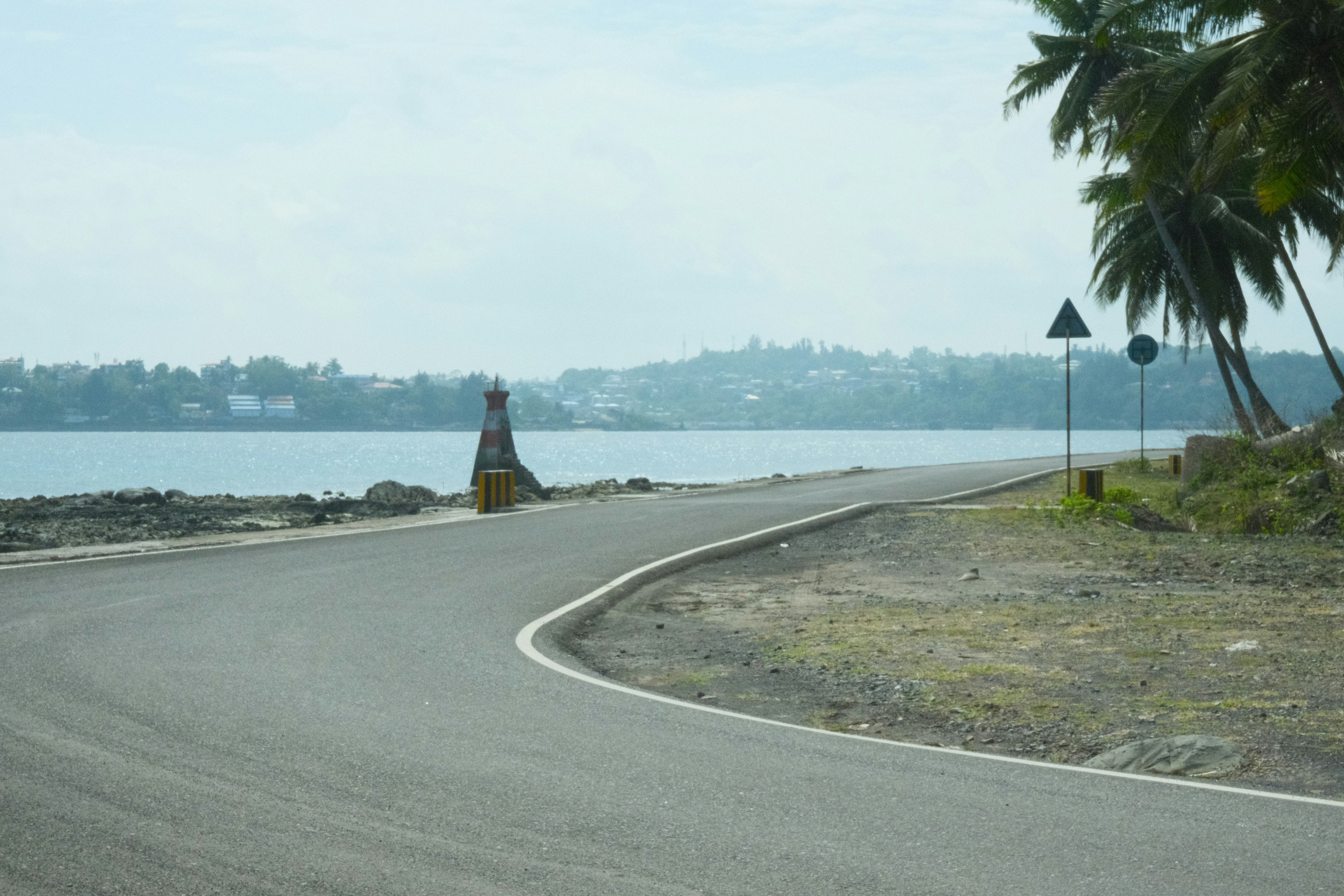 Coastal Curve: Asphalt Ribbon Toward the Horizon