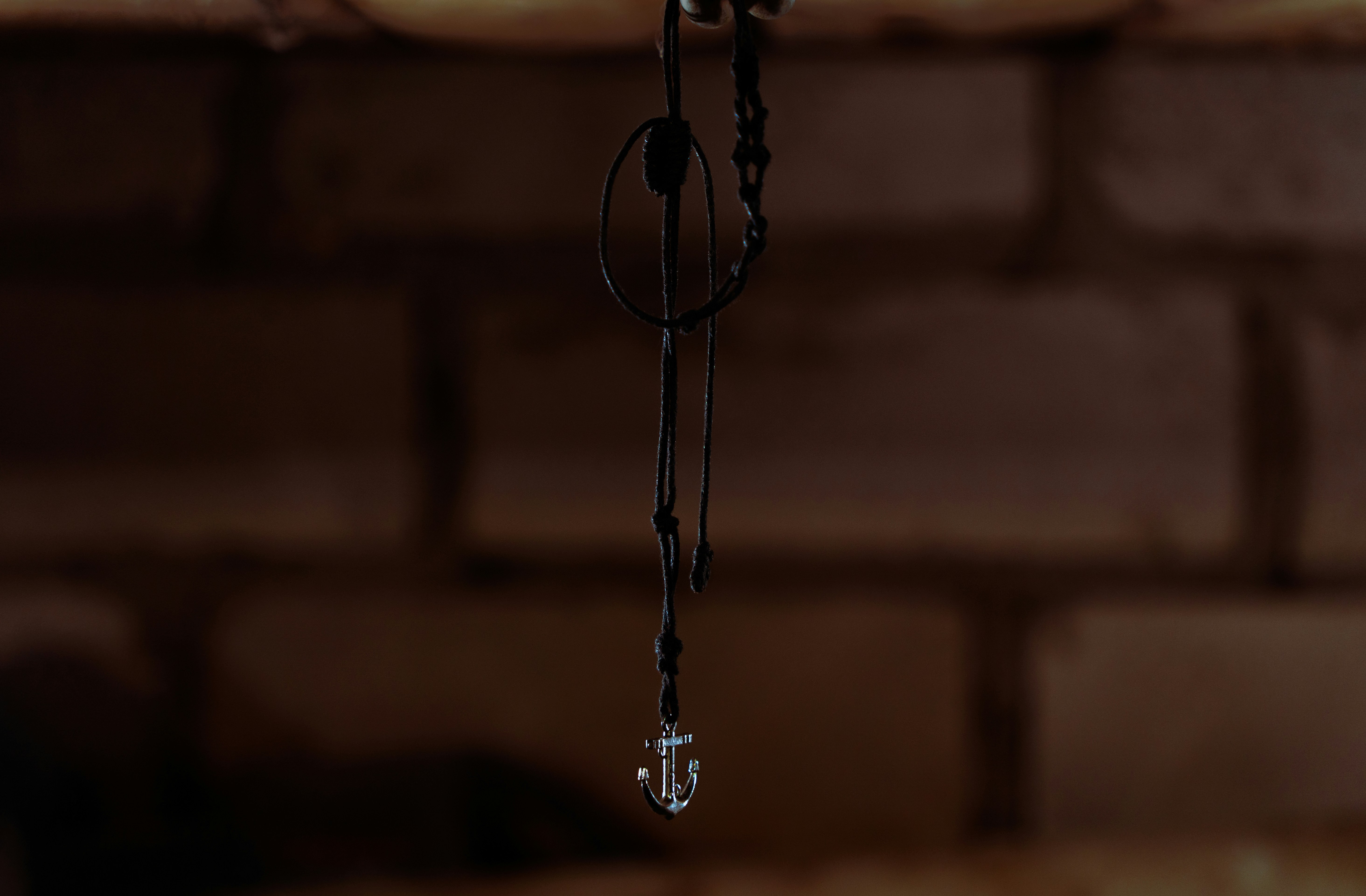 Dangling Anchor: A Quiet Union of Cord and Metal