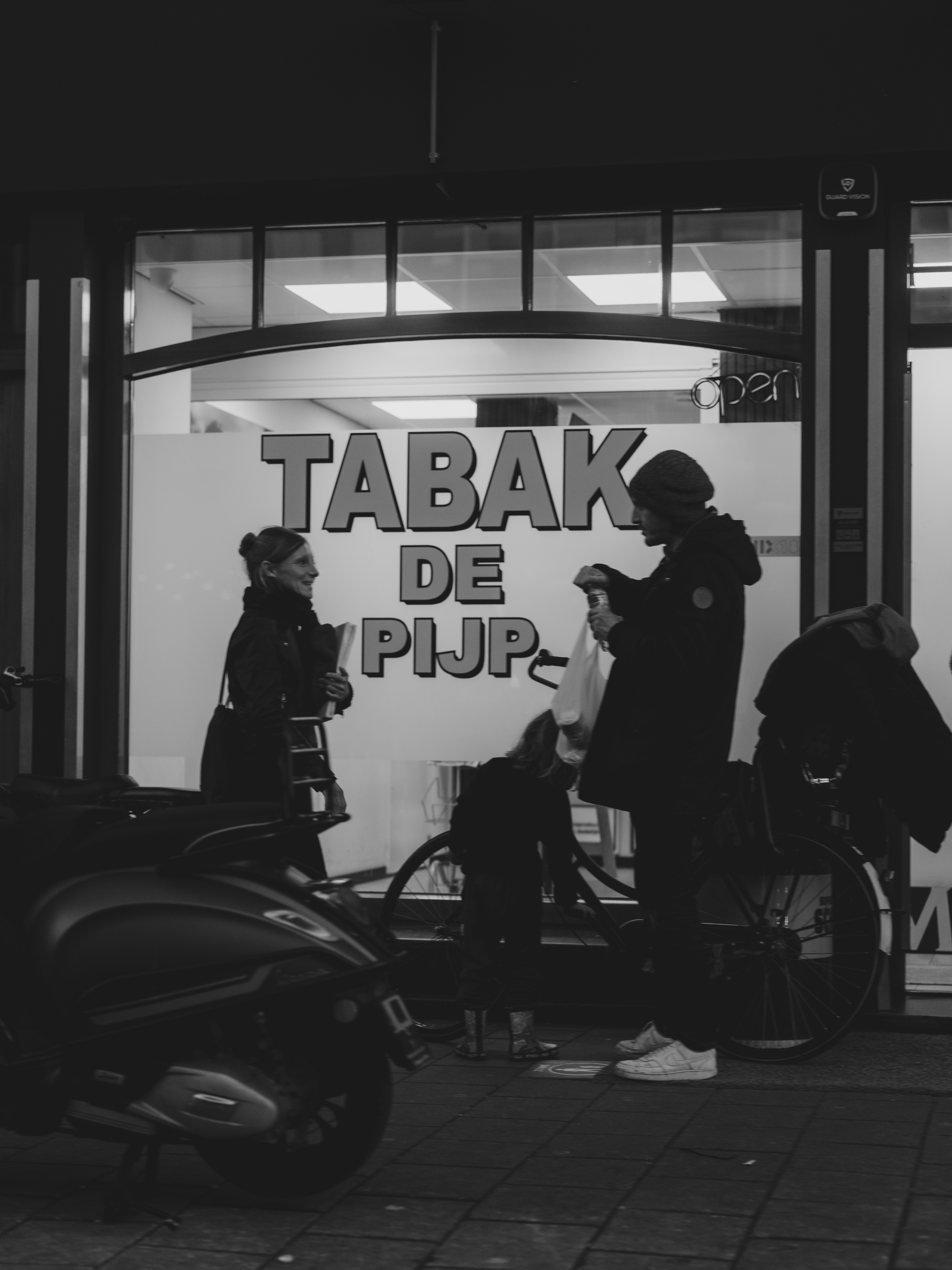 Midnight Encounter at the Tabak Window