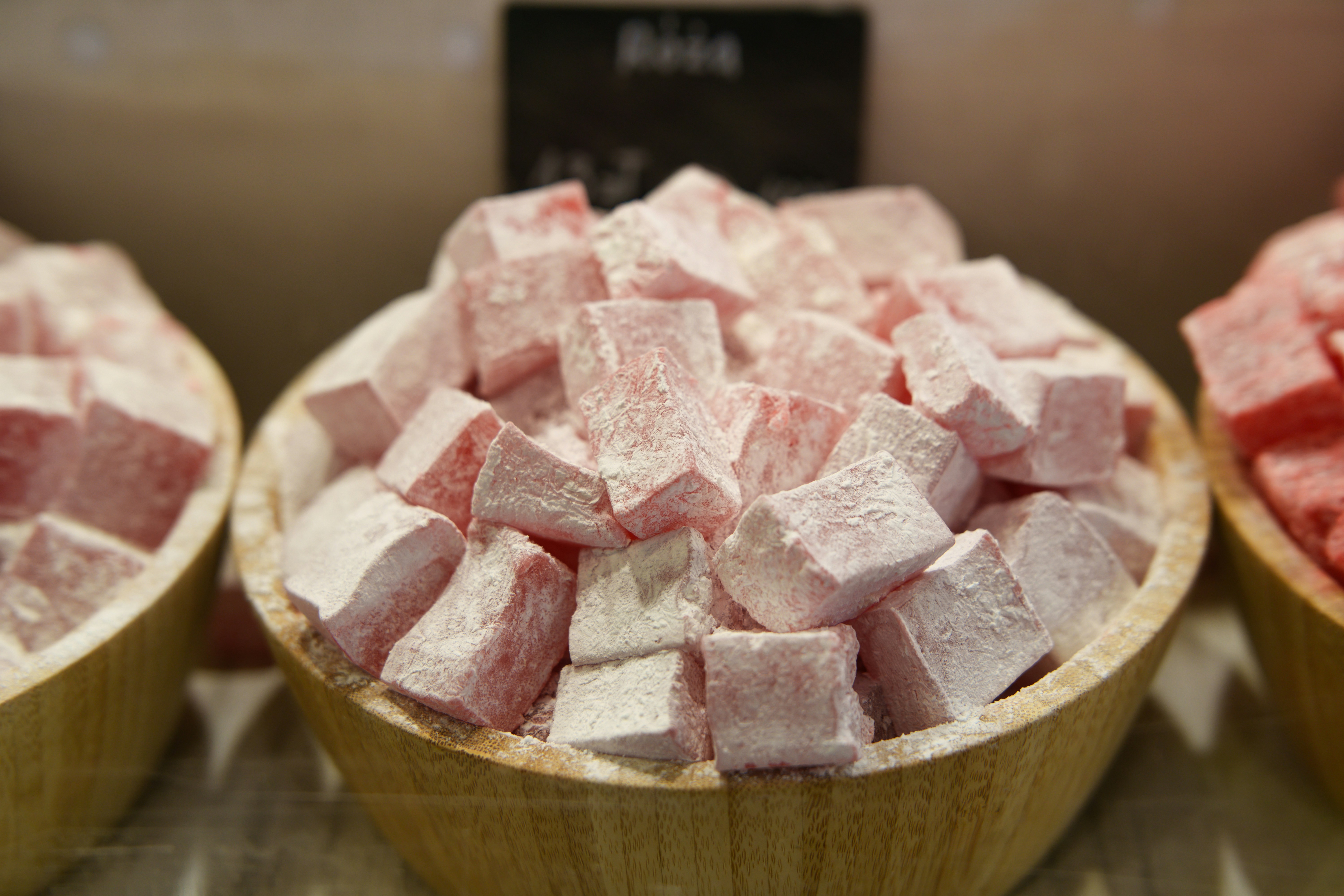 Pink turkish delight cubes dusted with powdered sugar. photo – Free ...