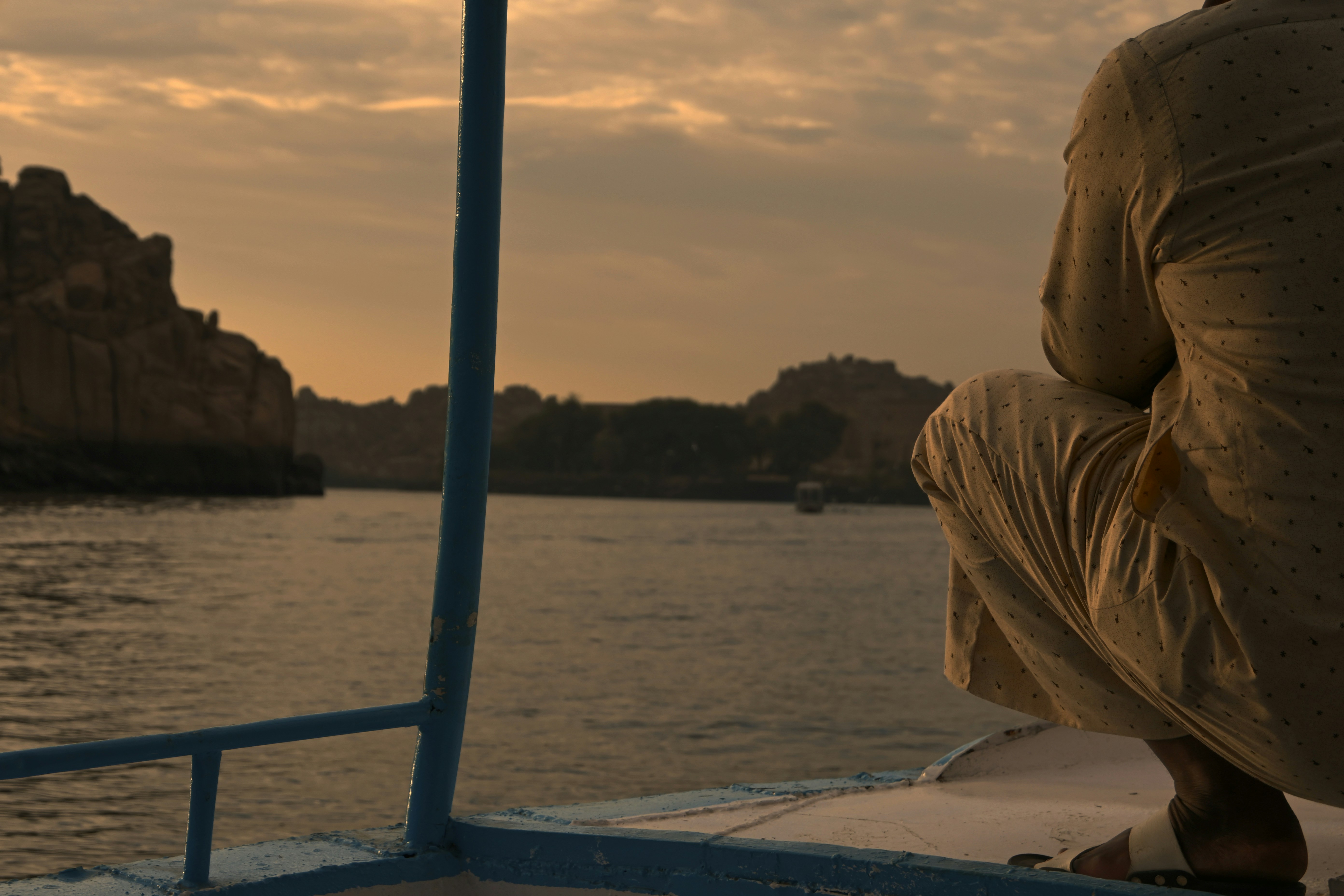 Onboard at Dusk: A Moment of Quiet by the Water
