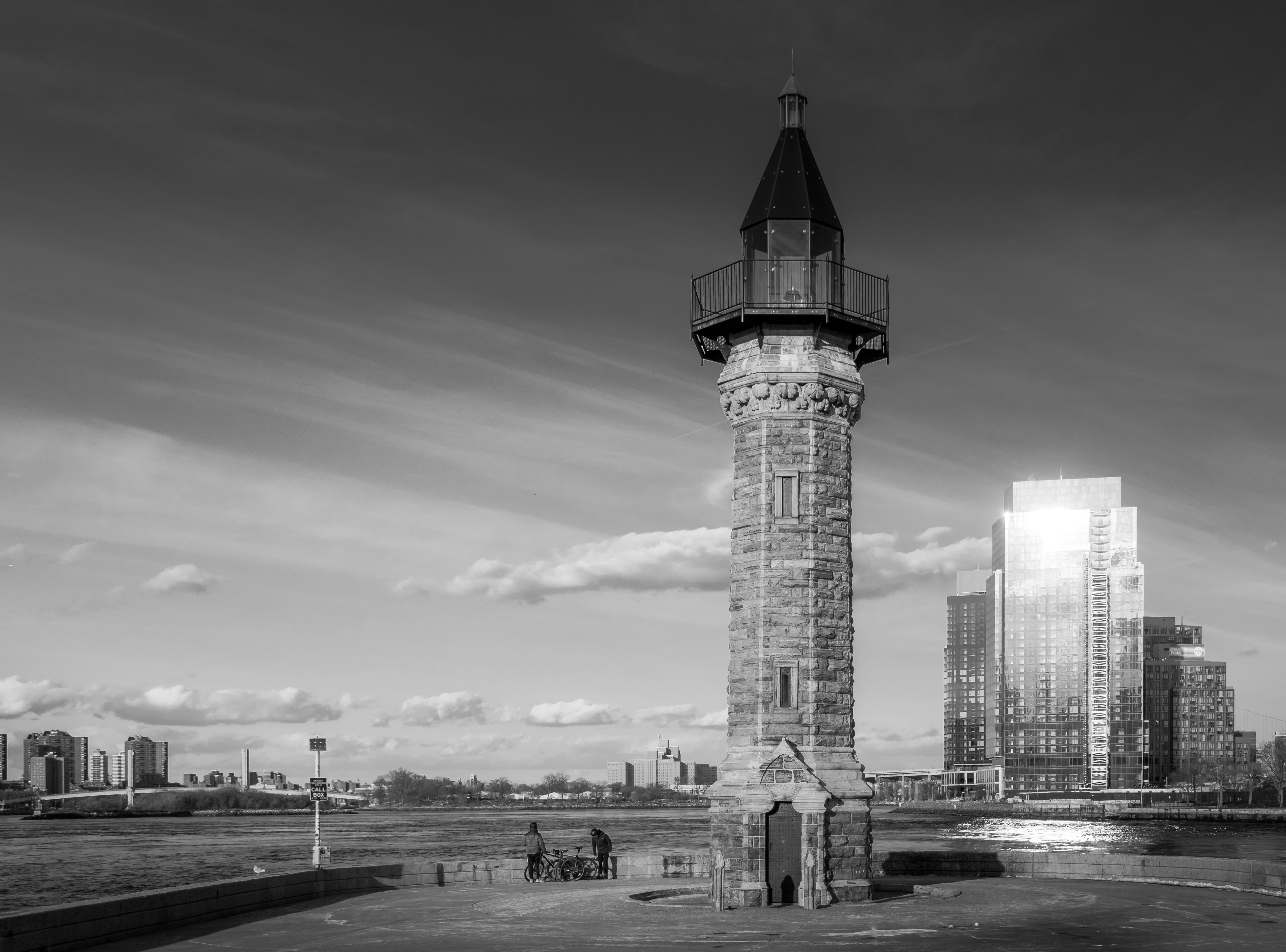 Lighthouse on the Edge: A Quiet Riverside Singleton amid Urban Glow