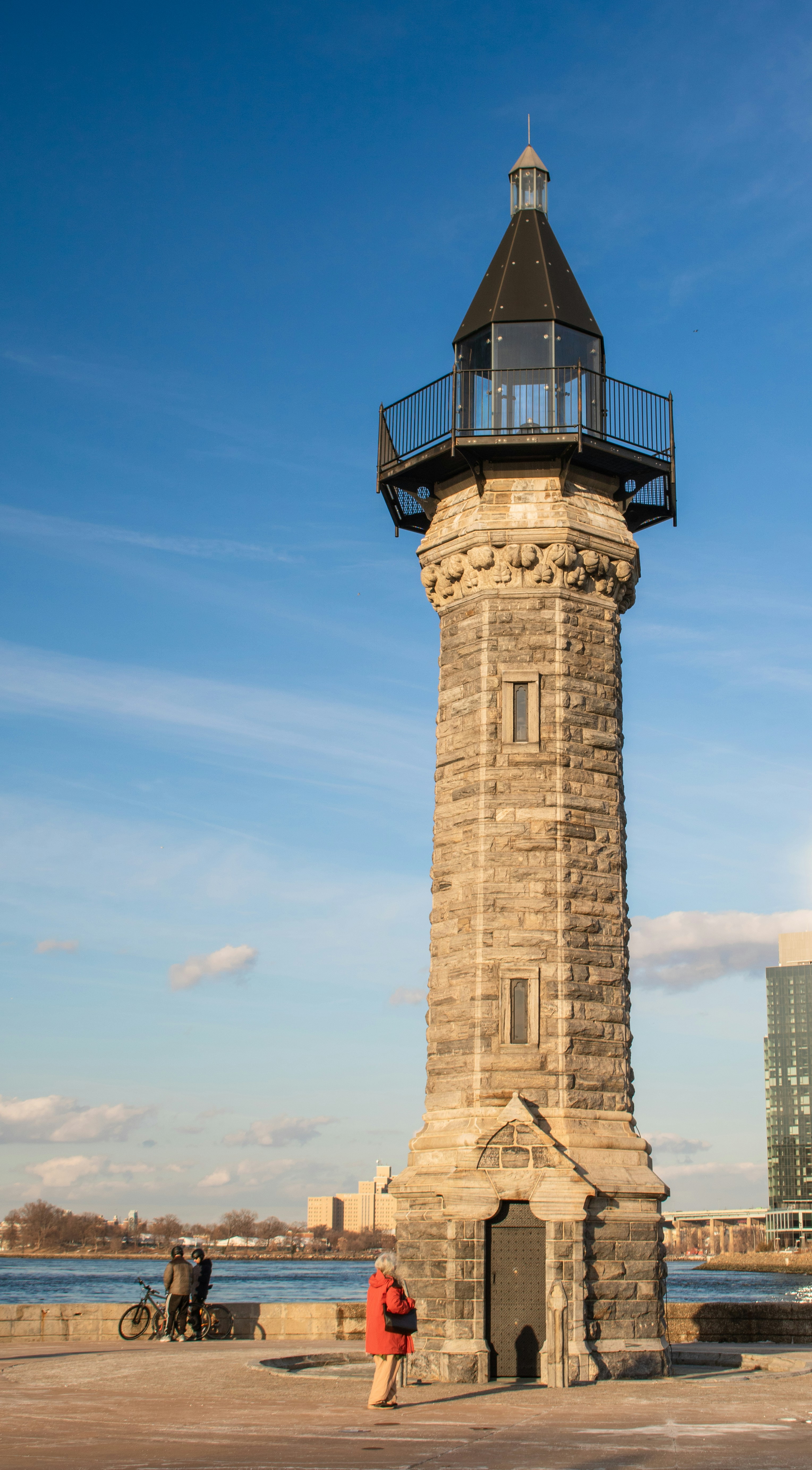 Beacon by the Waterfront: A Stone Tower Reaches Toward the Sky
