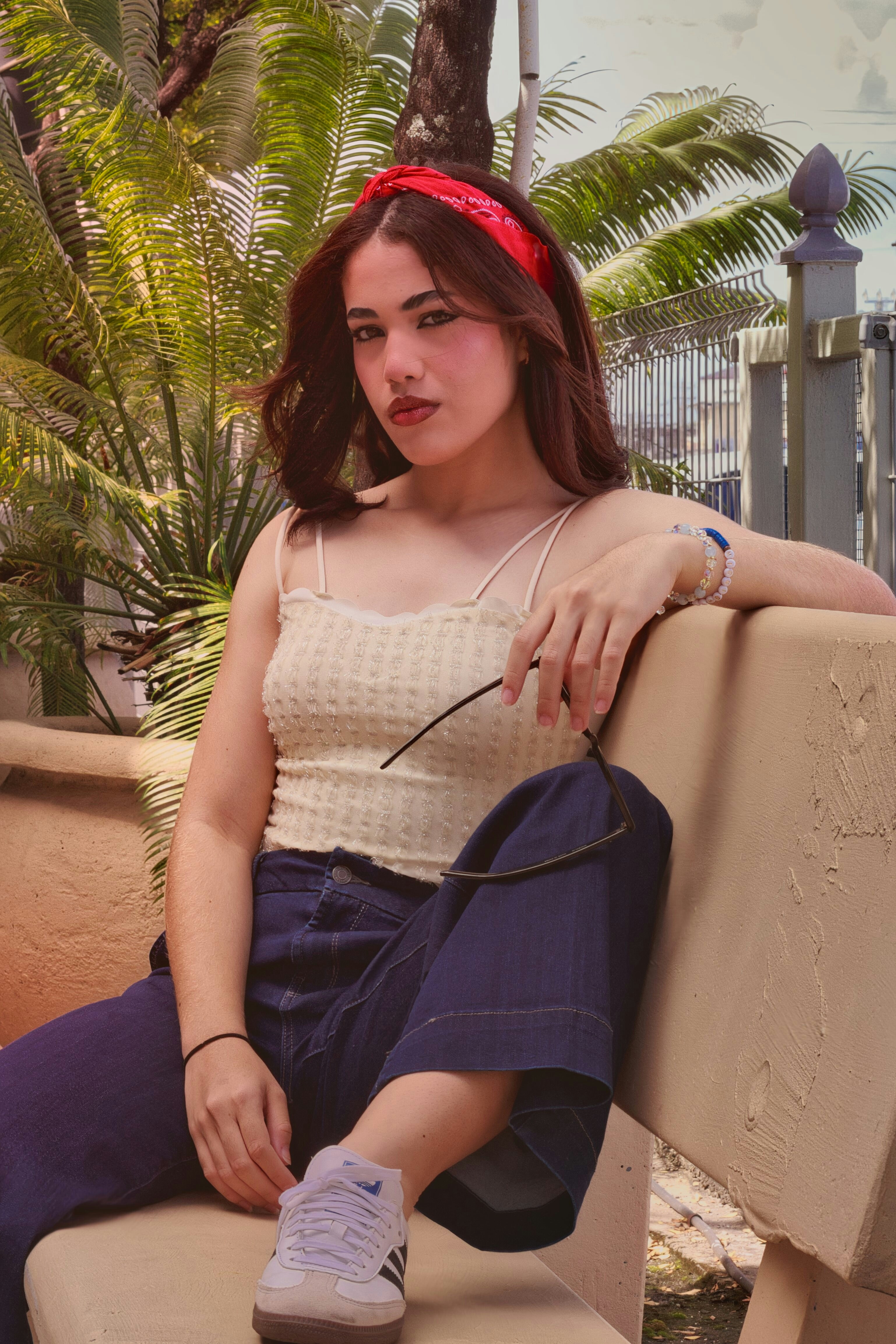 Red Bandana and Relaxed Gaze: A Summer Portrait on the Terrace