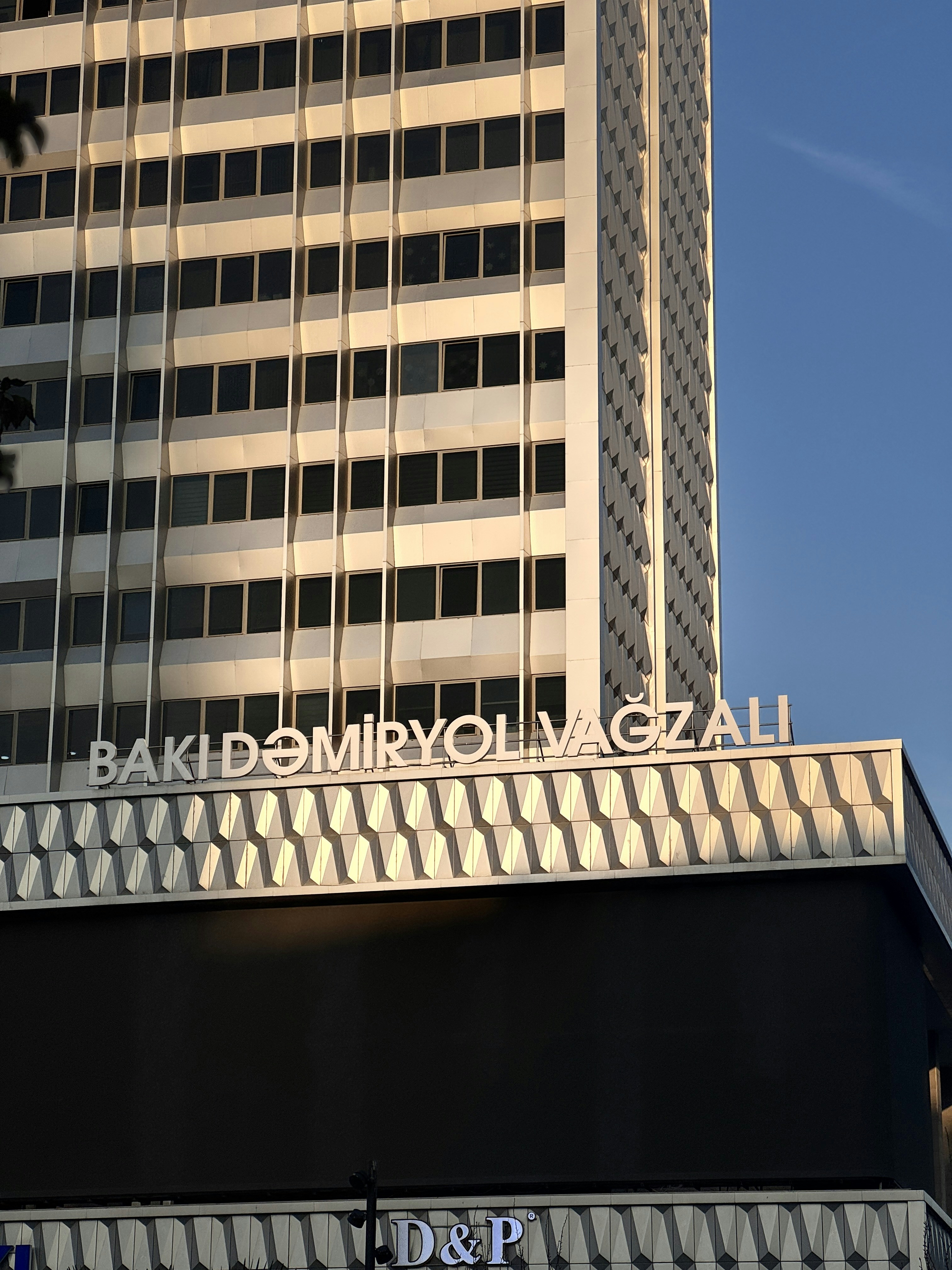 Vertical Grace: a City Block Crowned by Signage