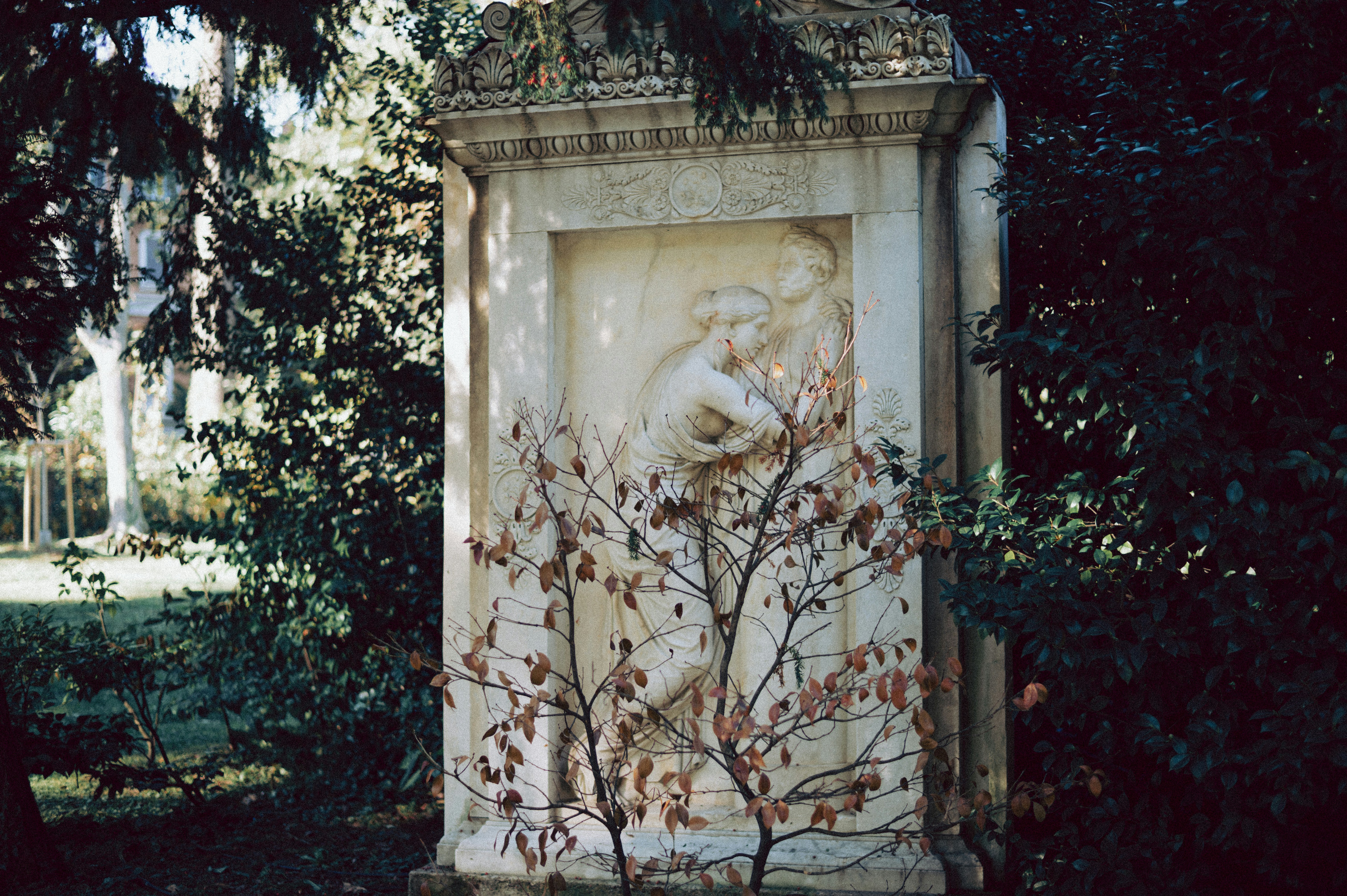 Stone Relief in a Shaded Garden Niche