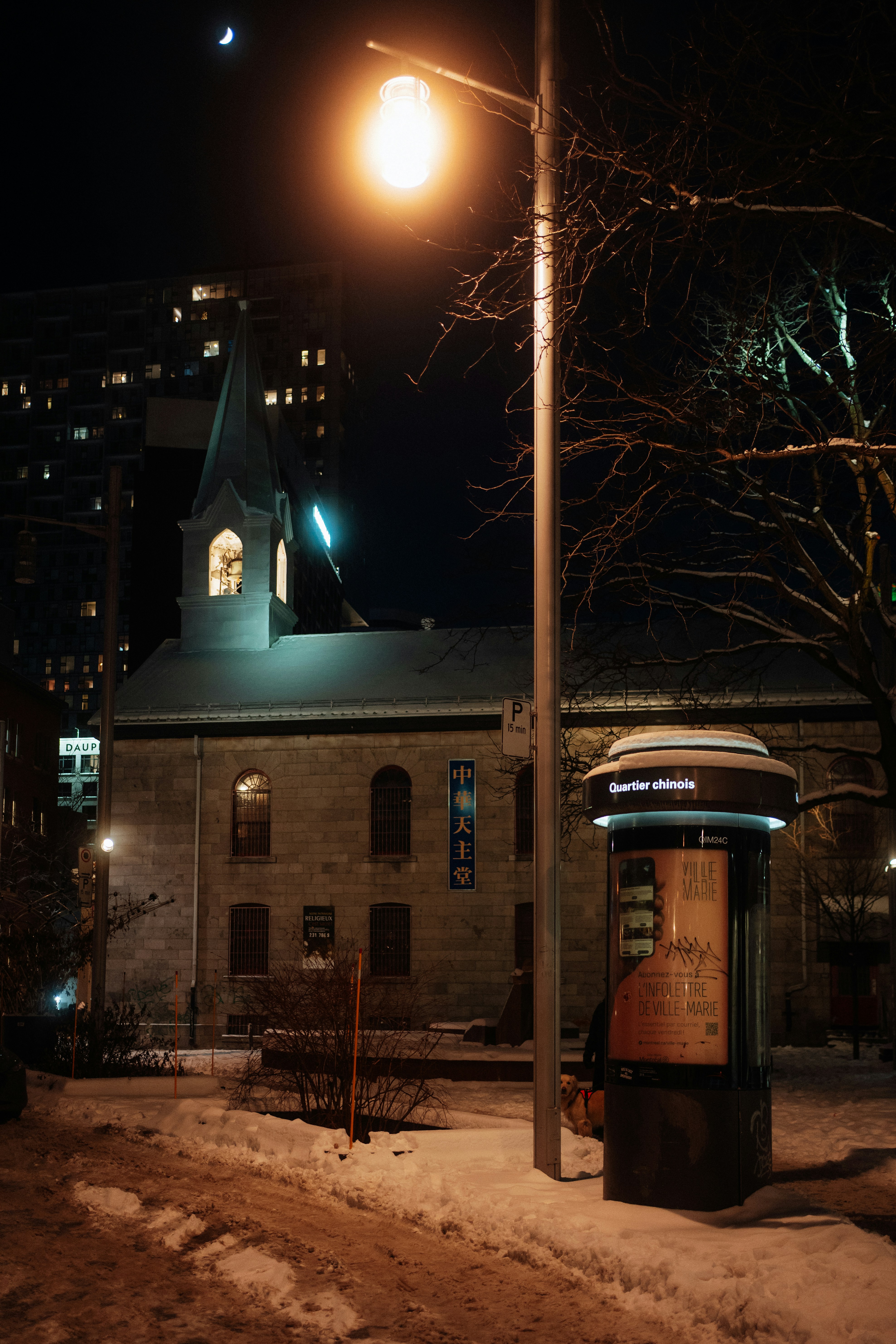 Night Street with Warm Lantern and Historic Church