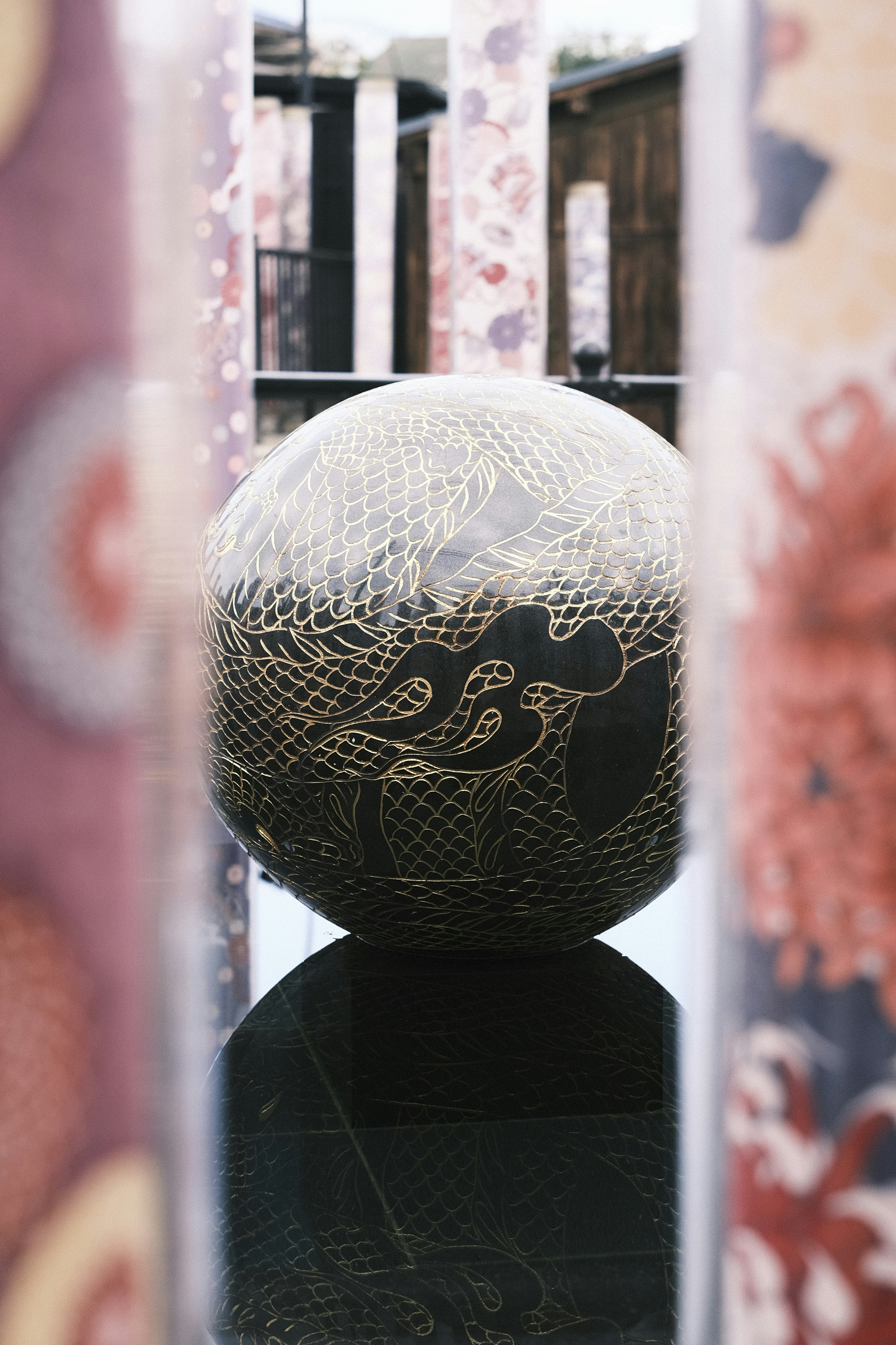 Dragon in the Glass: A Soaring Dragon Sphere Between Portrait Poles